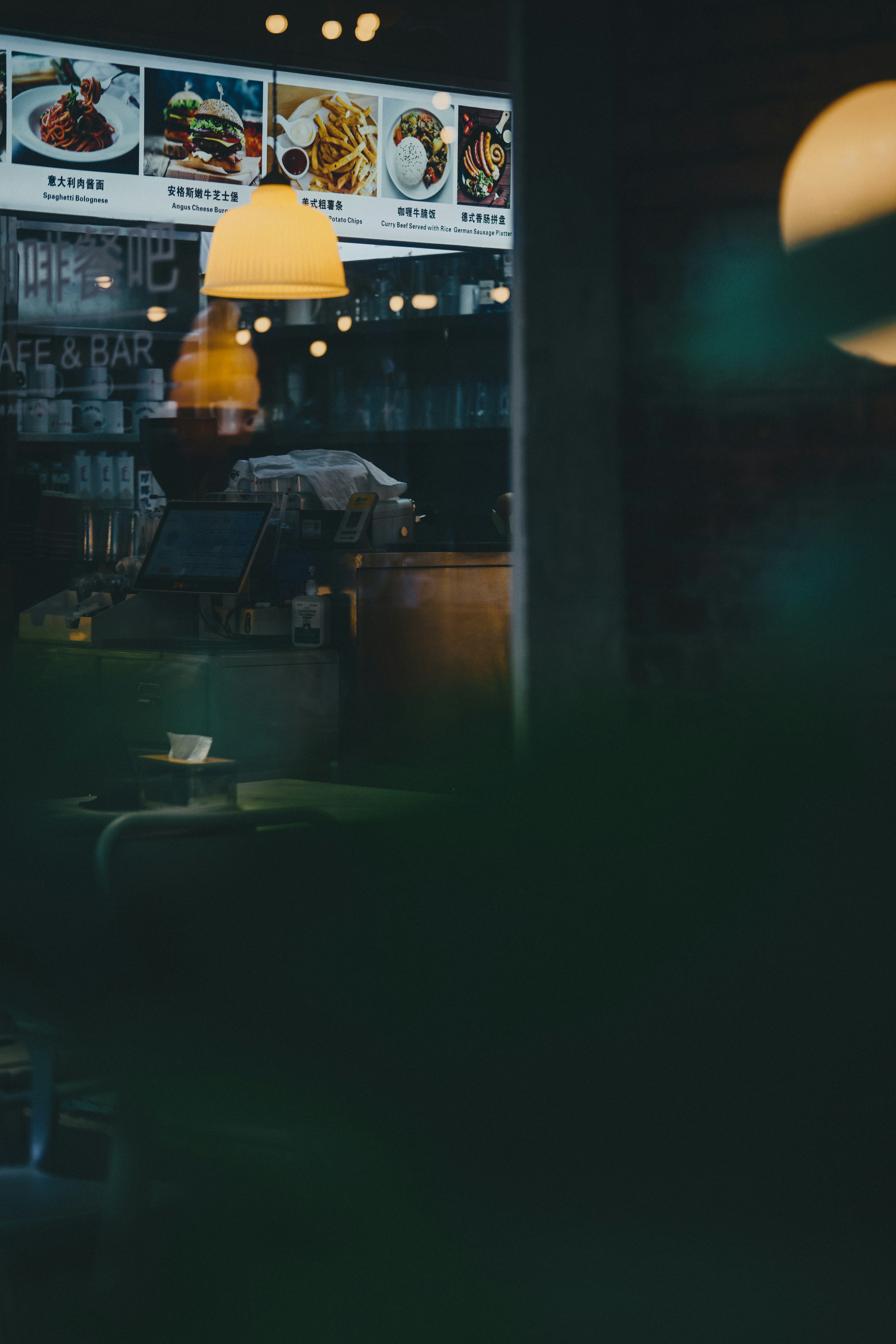 Neon Menu Glow Through a Café Window
