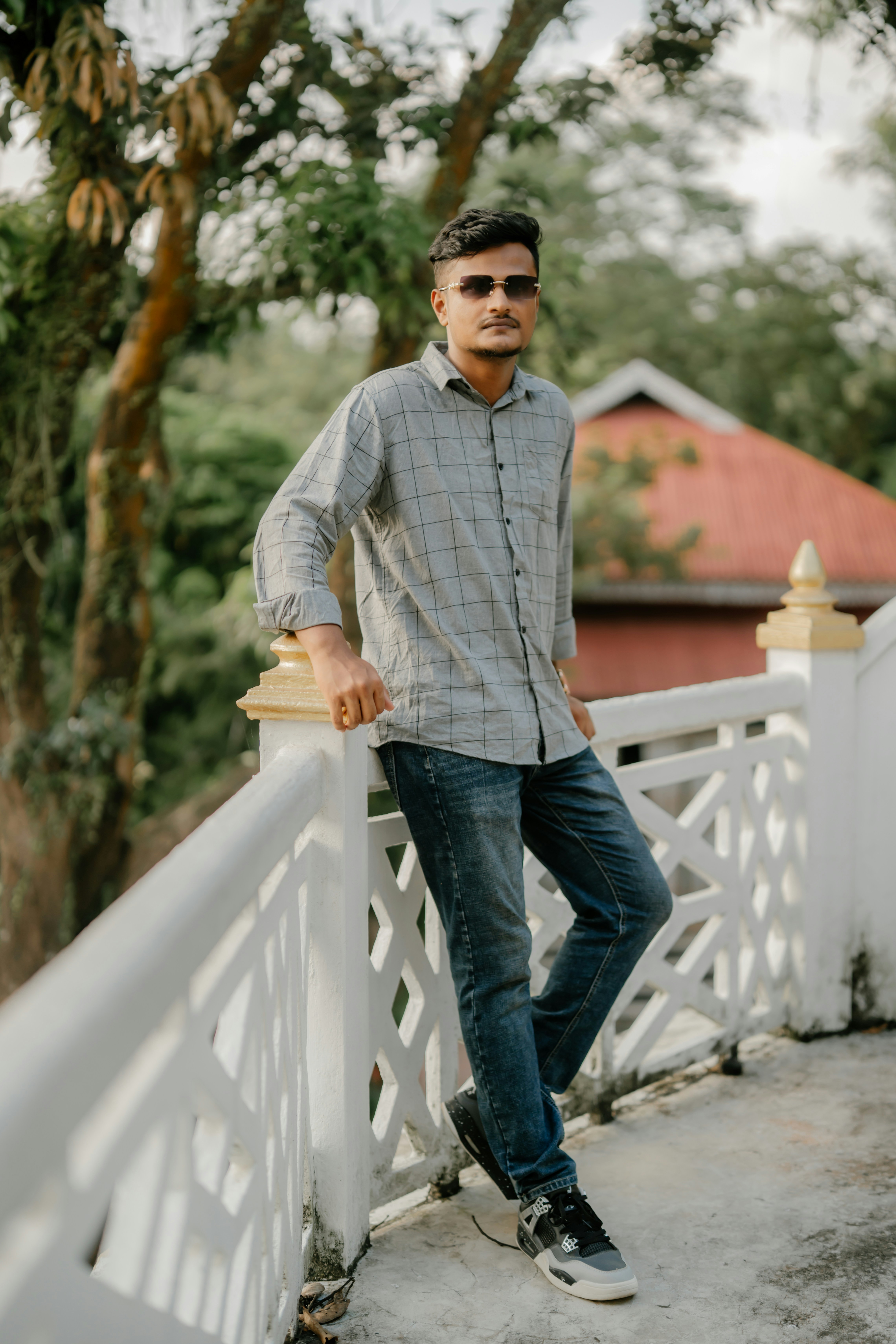 Casual Confidence on a Sunlit Balcony