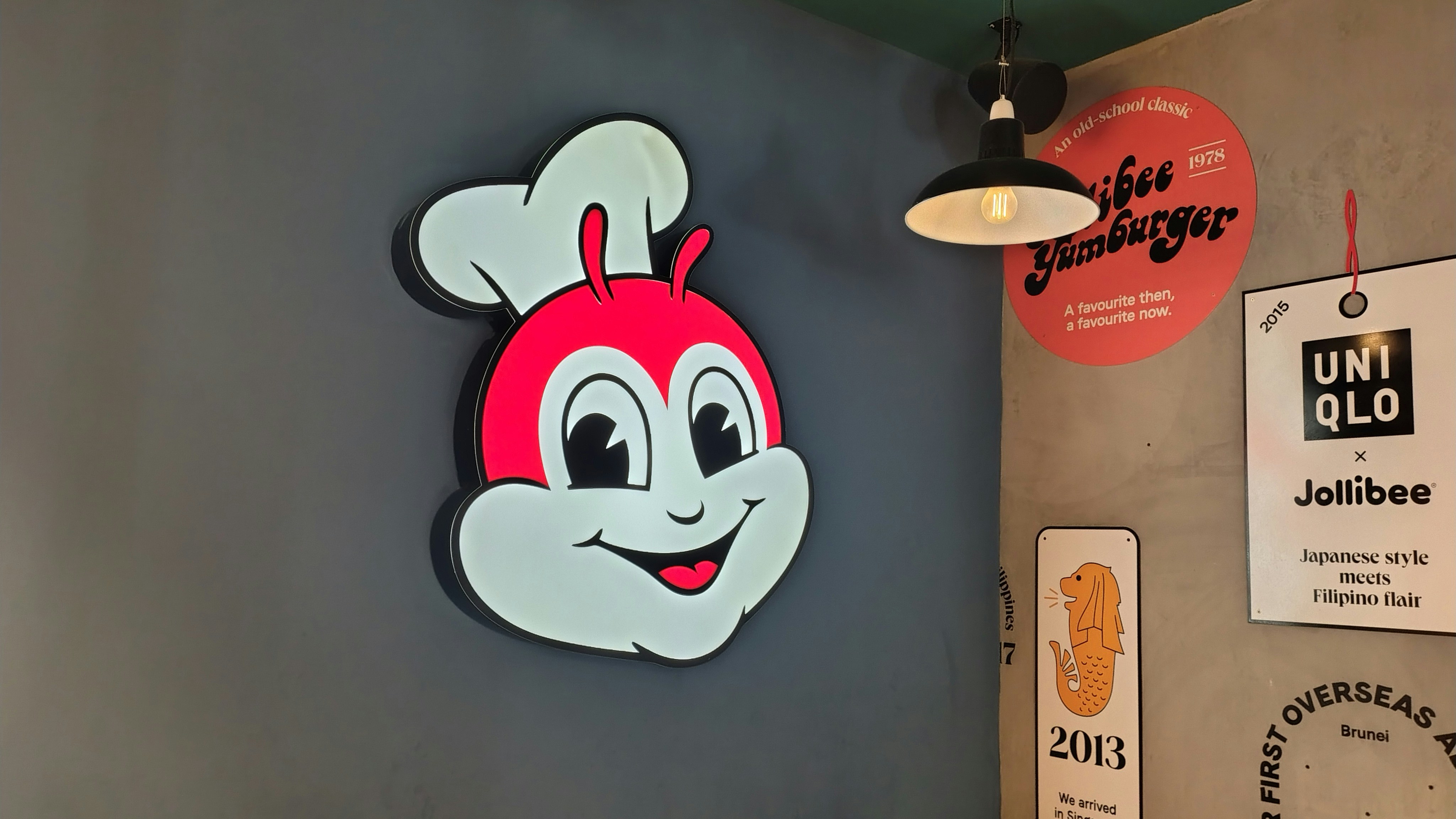 Cartoon Cheery Signboard: A Friendly Pixel Hug on the Wall