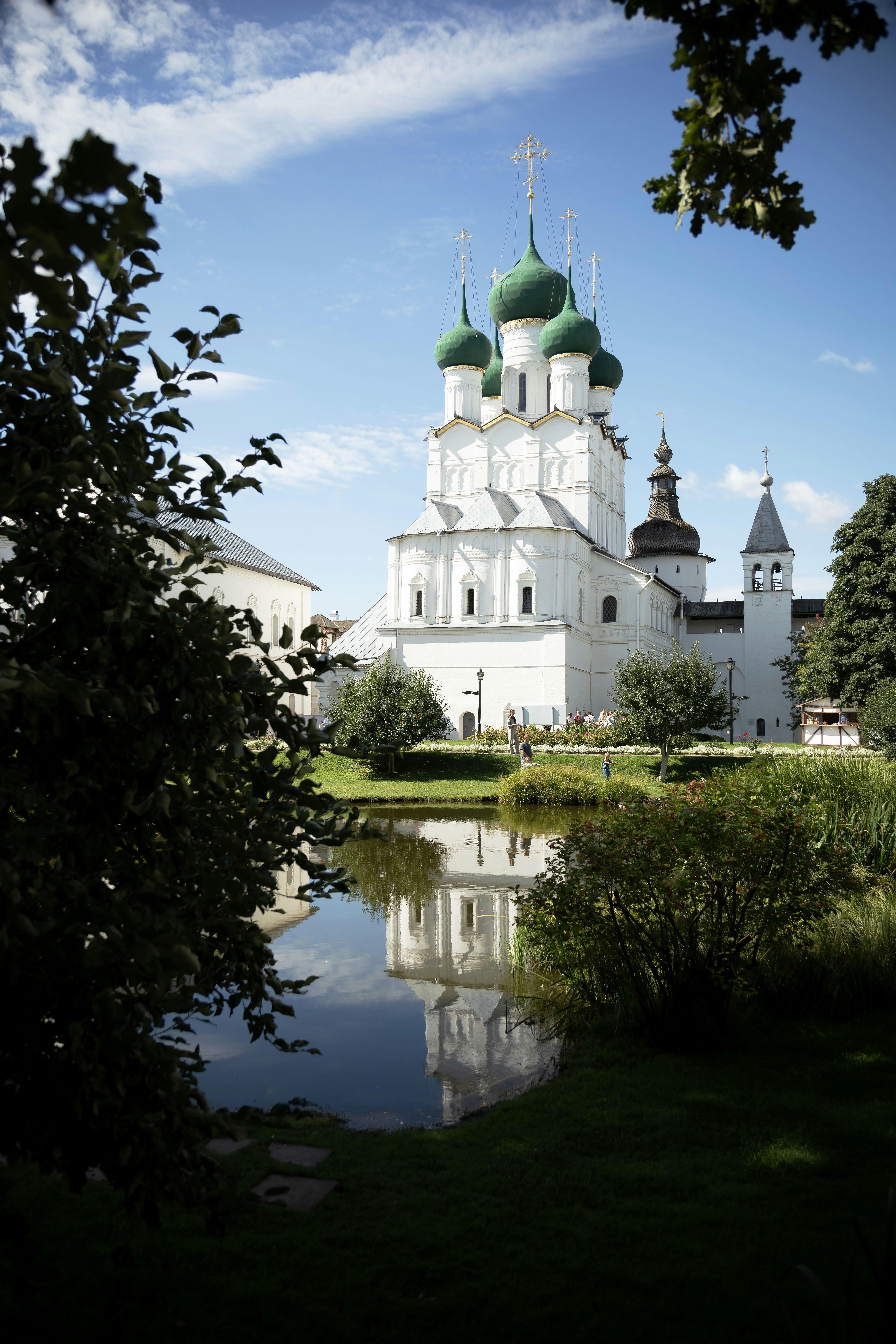 White Orthodox Cathedral Rising Over a Serene Pond