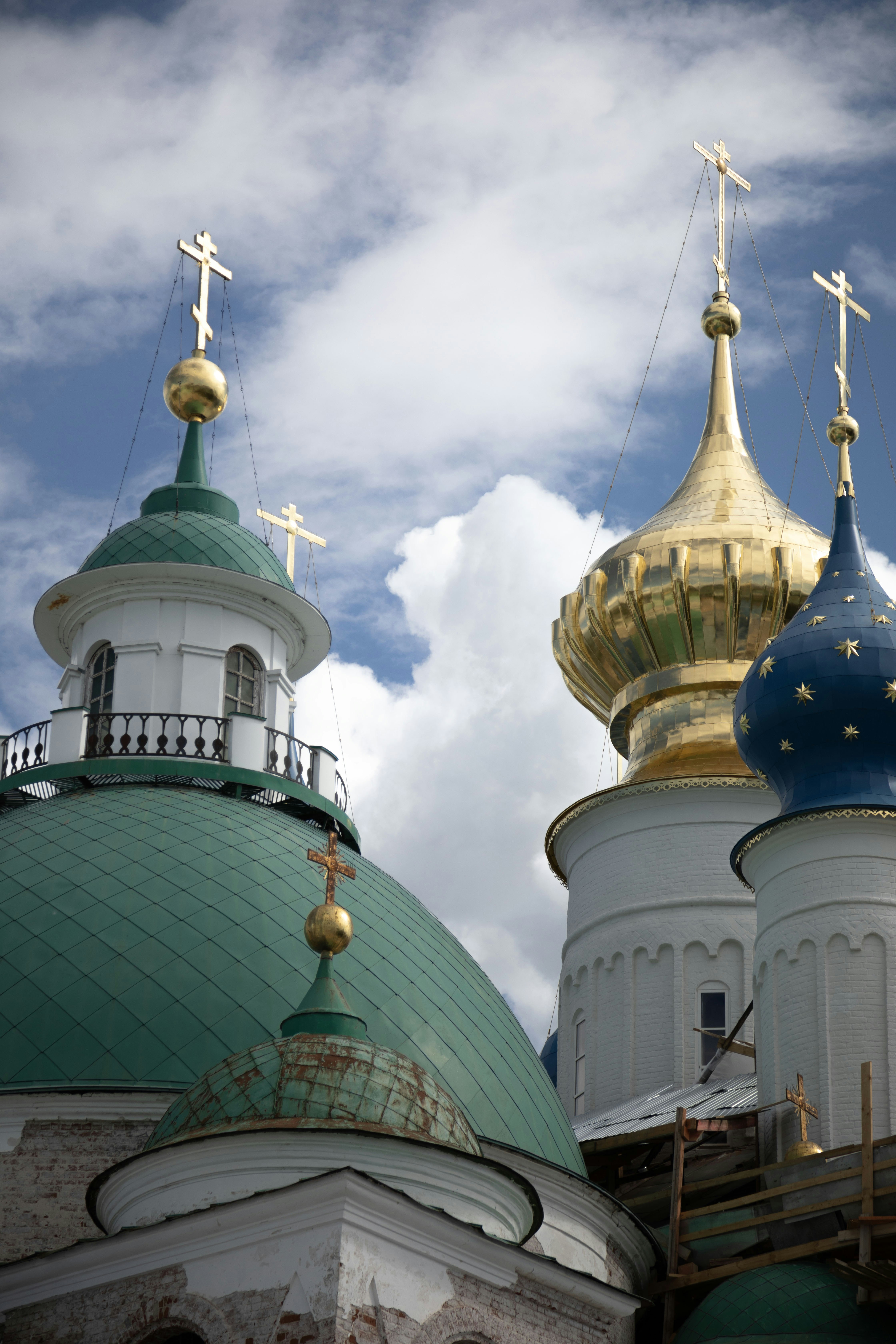 Gold Dome in the Sky: Cathedral Turrets Reaching Toward the Clouds