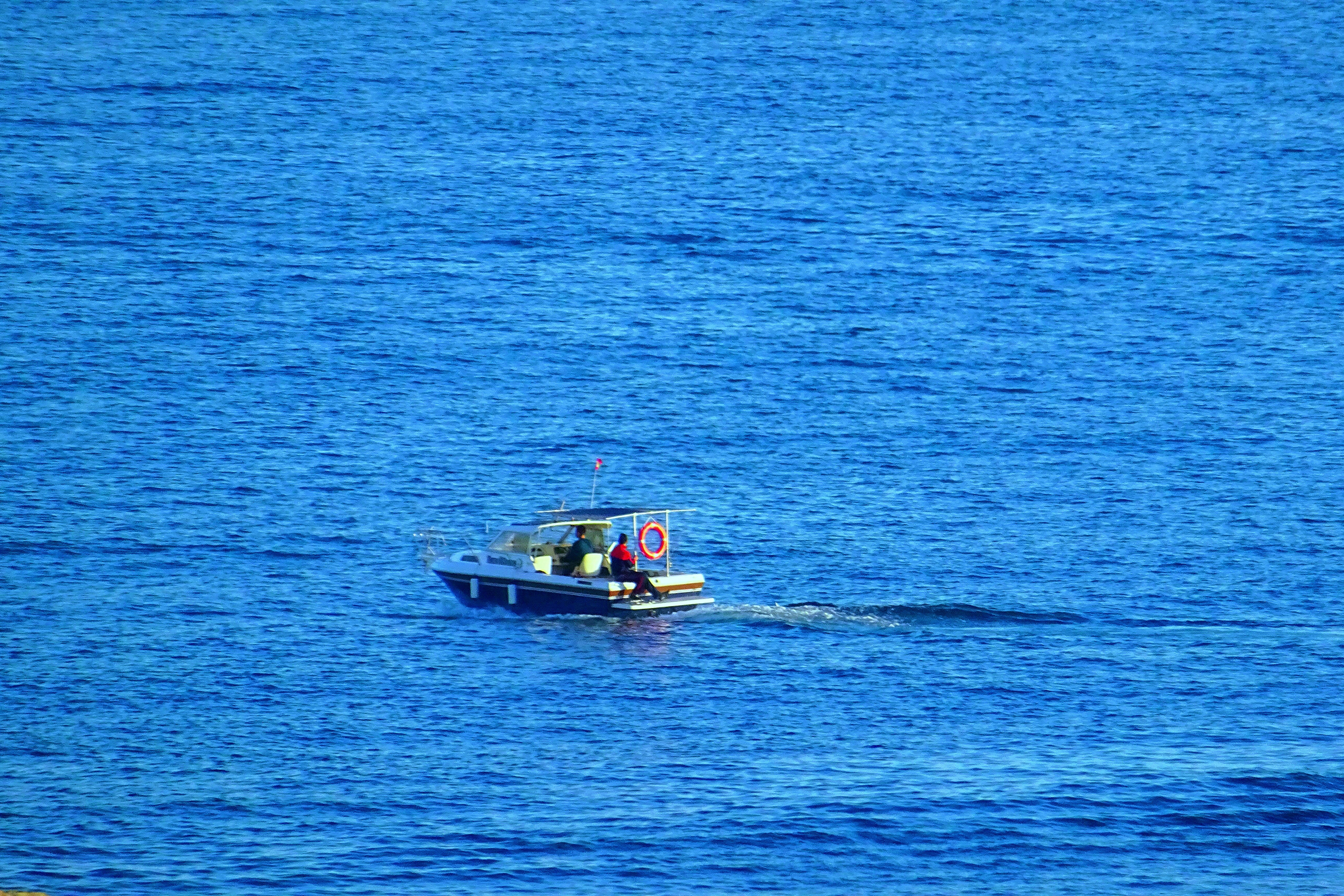 Boat on a Vast Blue Quiet