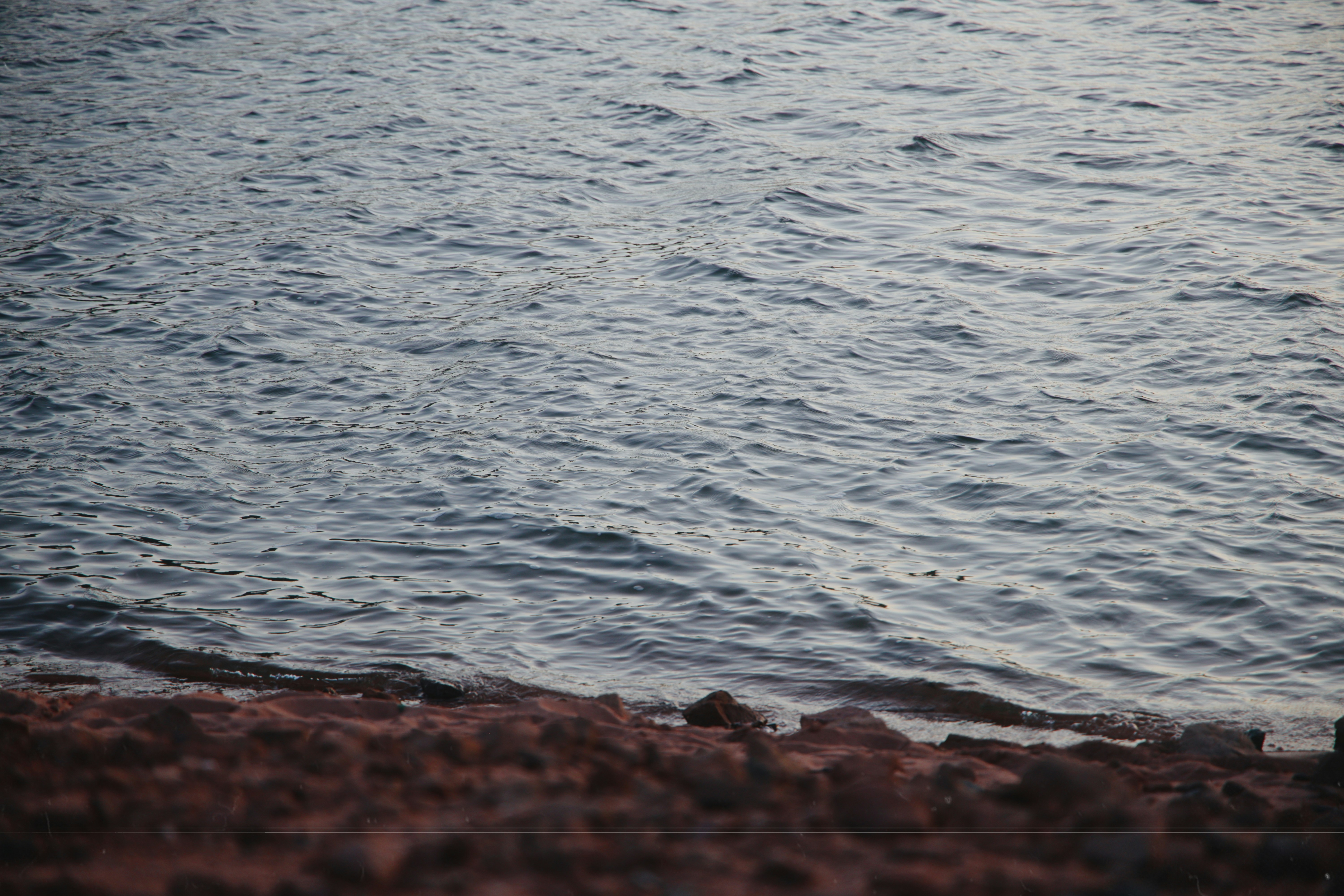 Rim of the Shore: Quiet Tides Beneath a Darkened Horizon