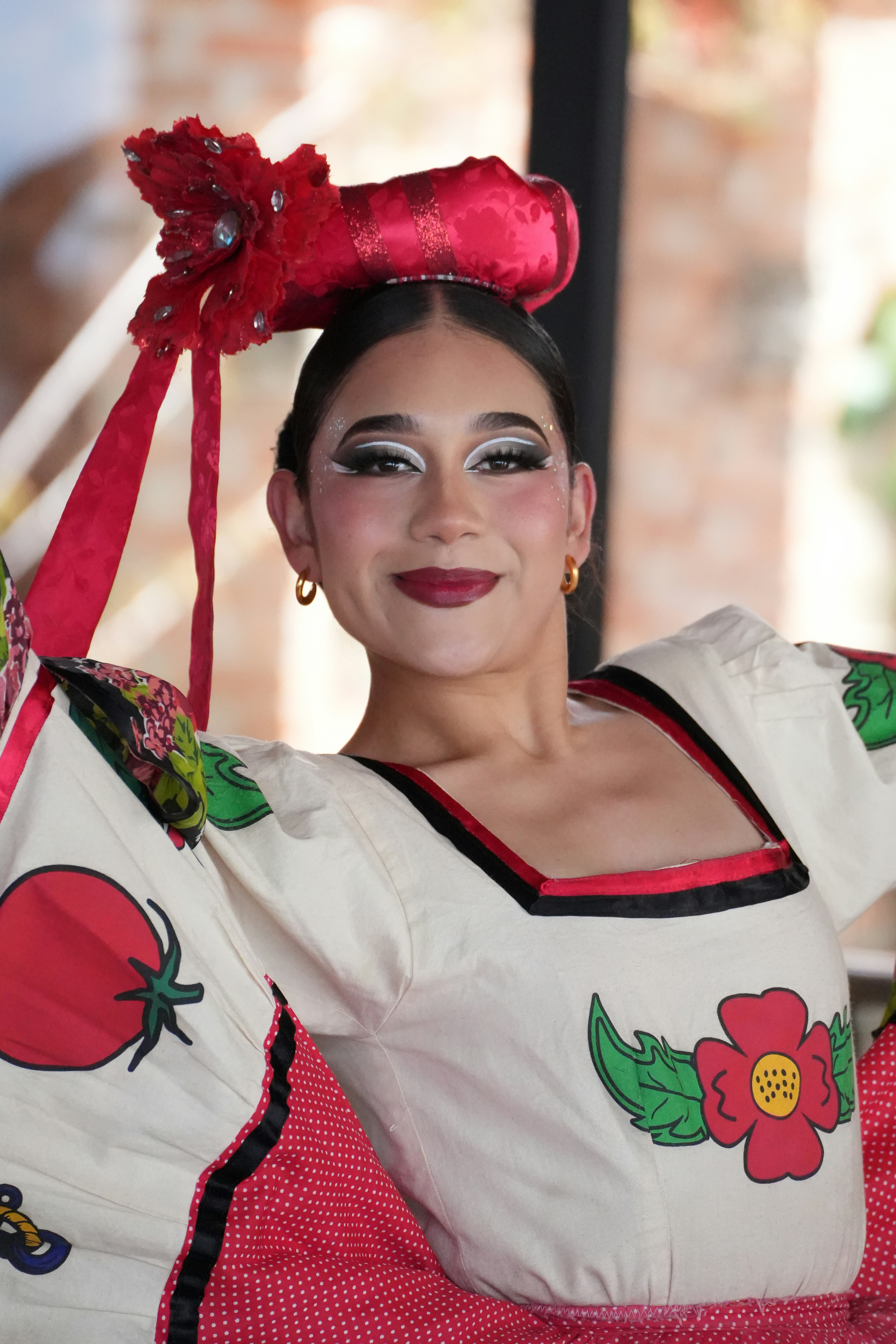Charismatic Flamenco-inspired Matador Pose with Red Headpiece