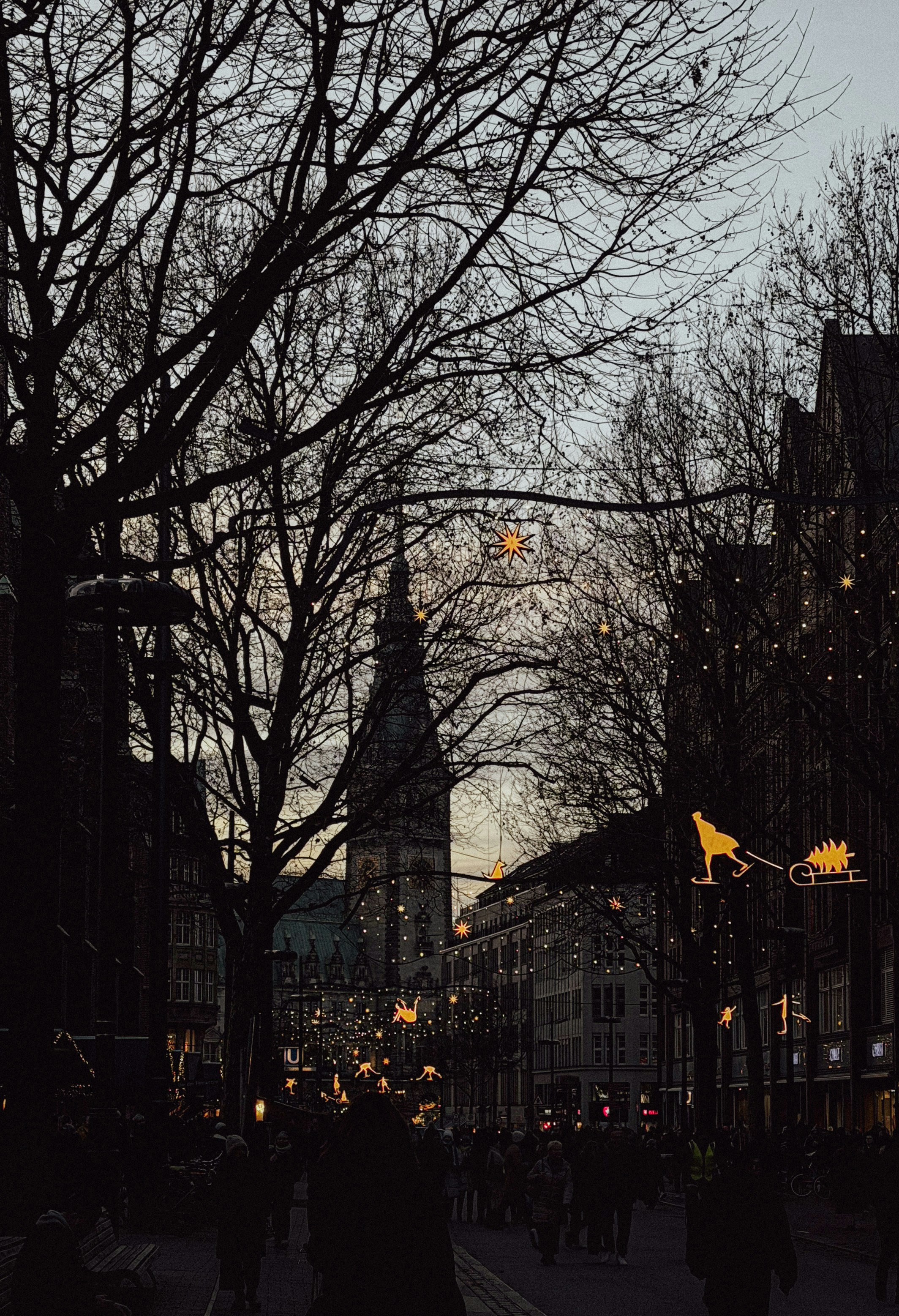 City Twilight: Winter Lights Weaving Through Rooftops