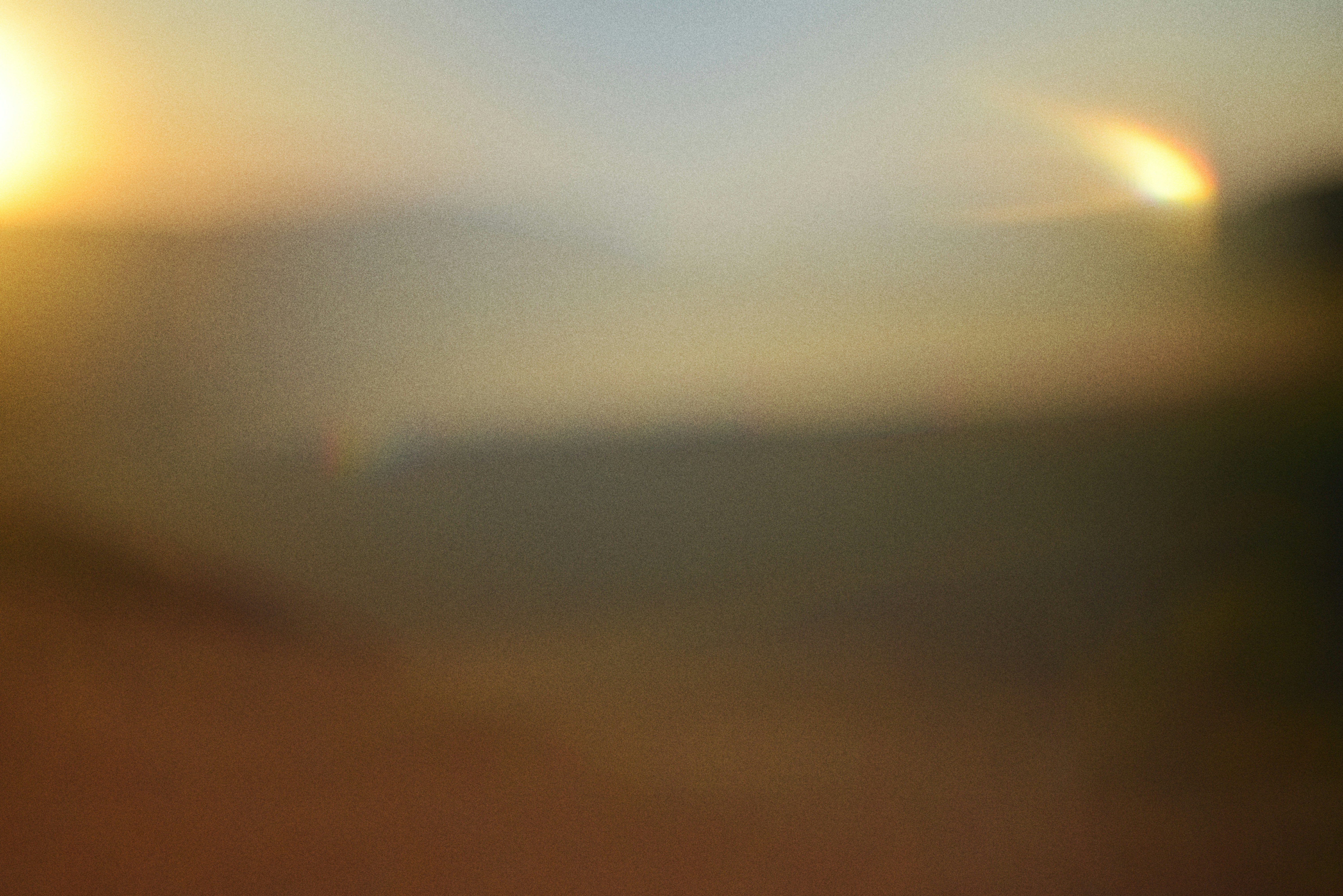 Sunset Blur over Distant Shore