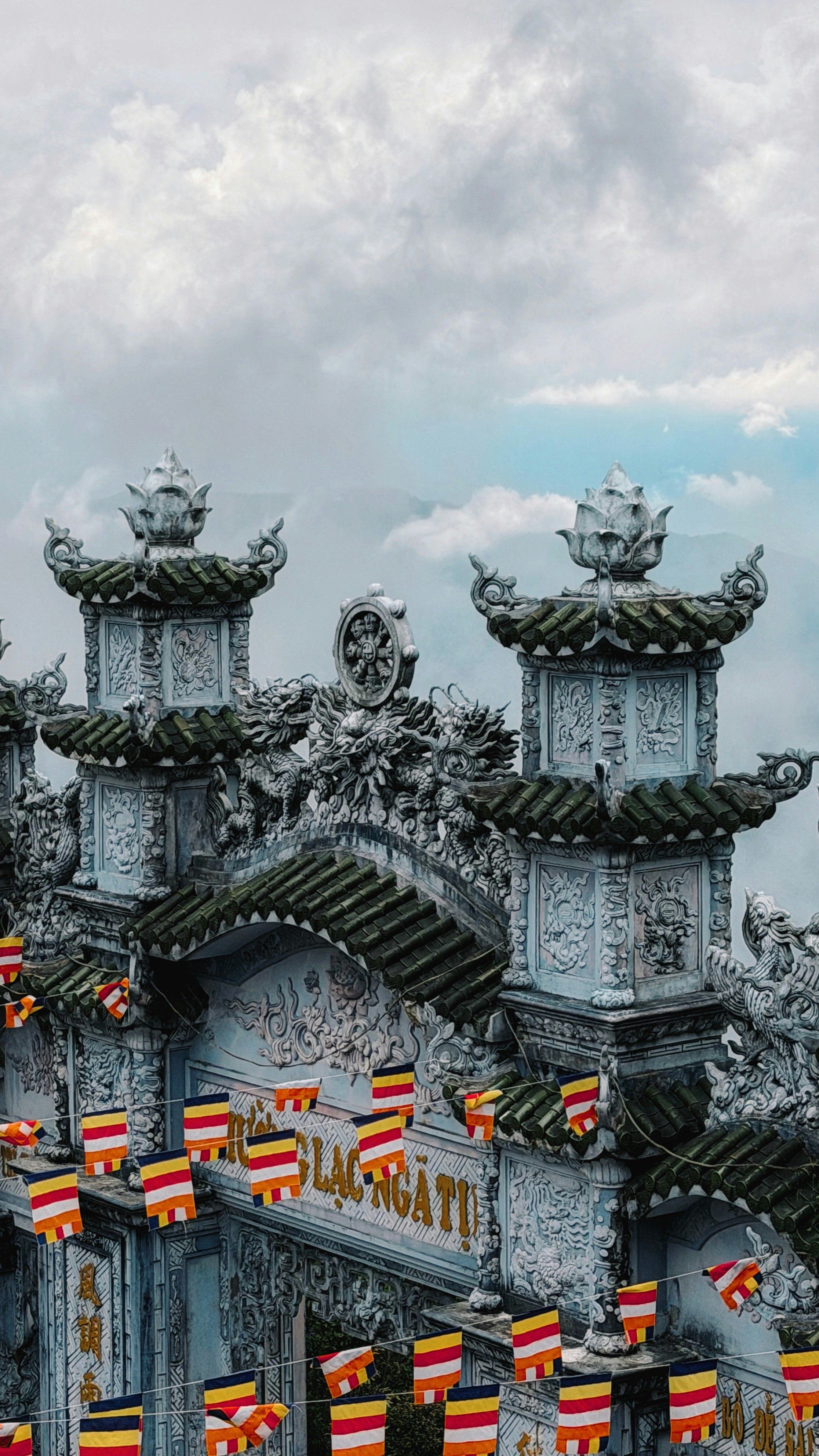 Dragon-crest Gateway Under cloudy Sky