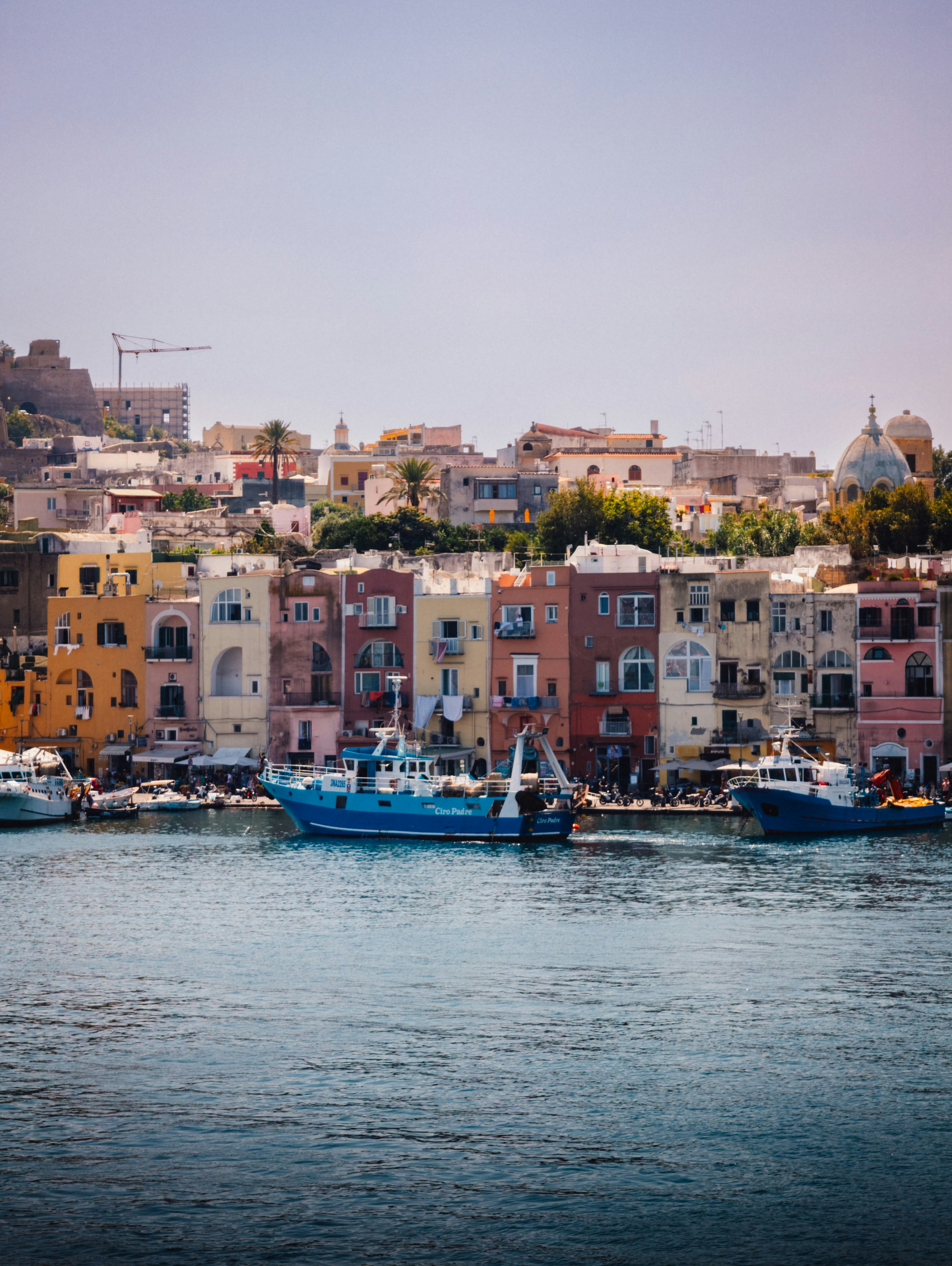 Colorful waterfront village under calm morning light