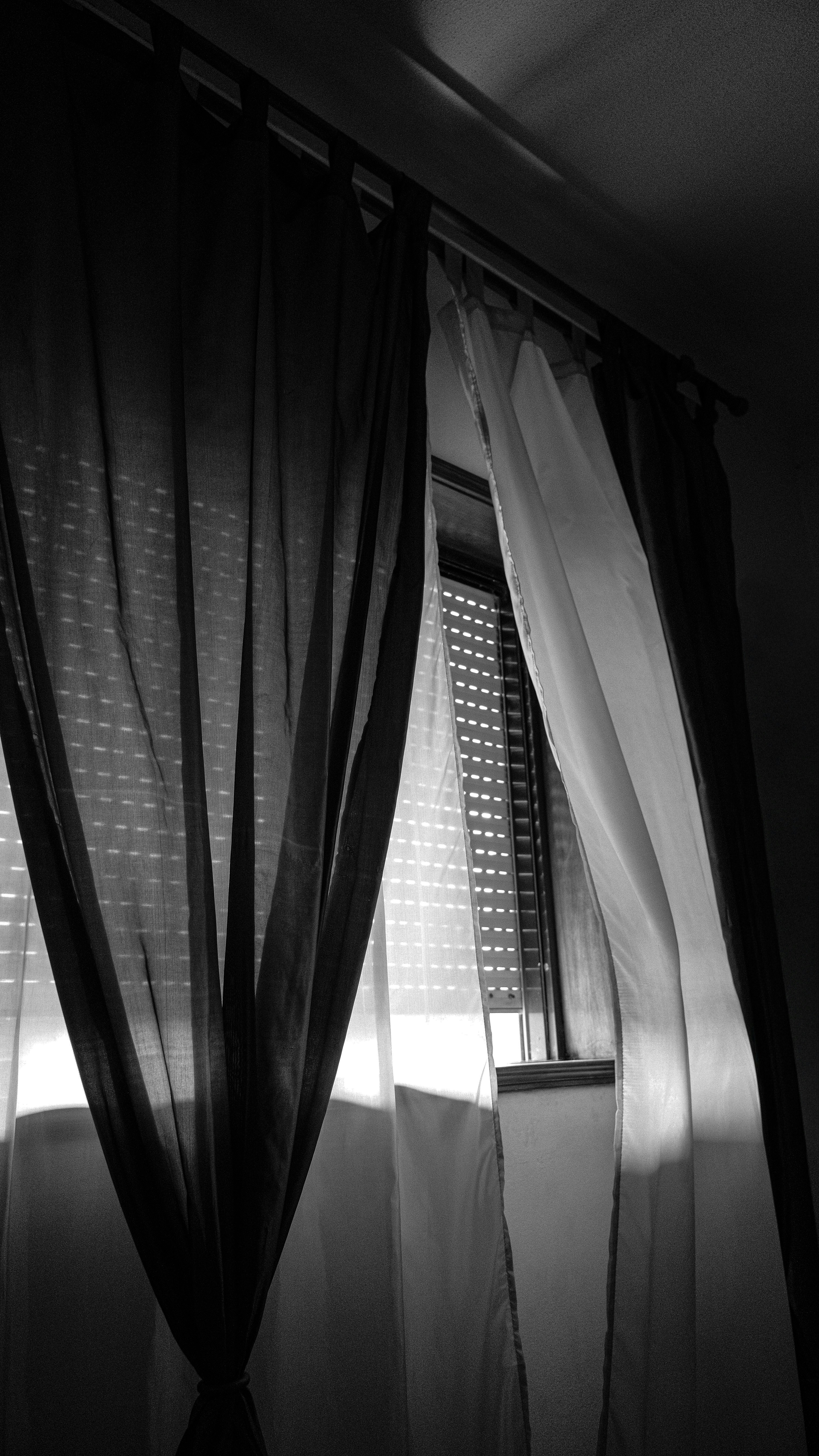 Curtains at Window: Subtle Light Through Sheer Fabrics