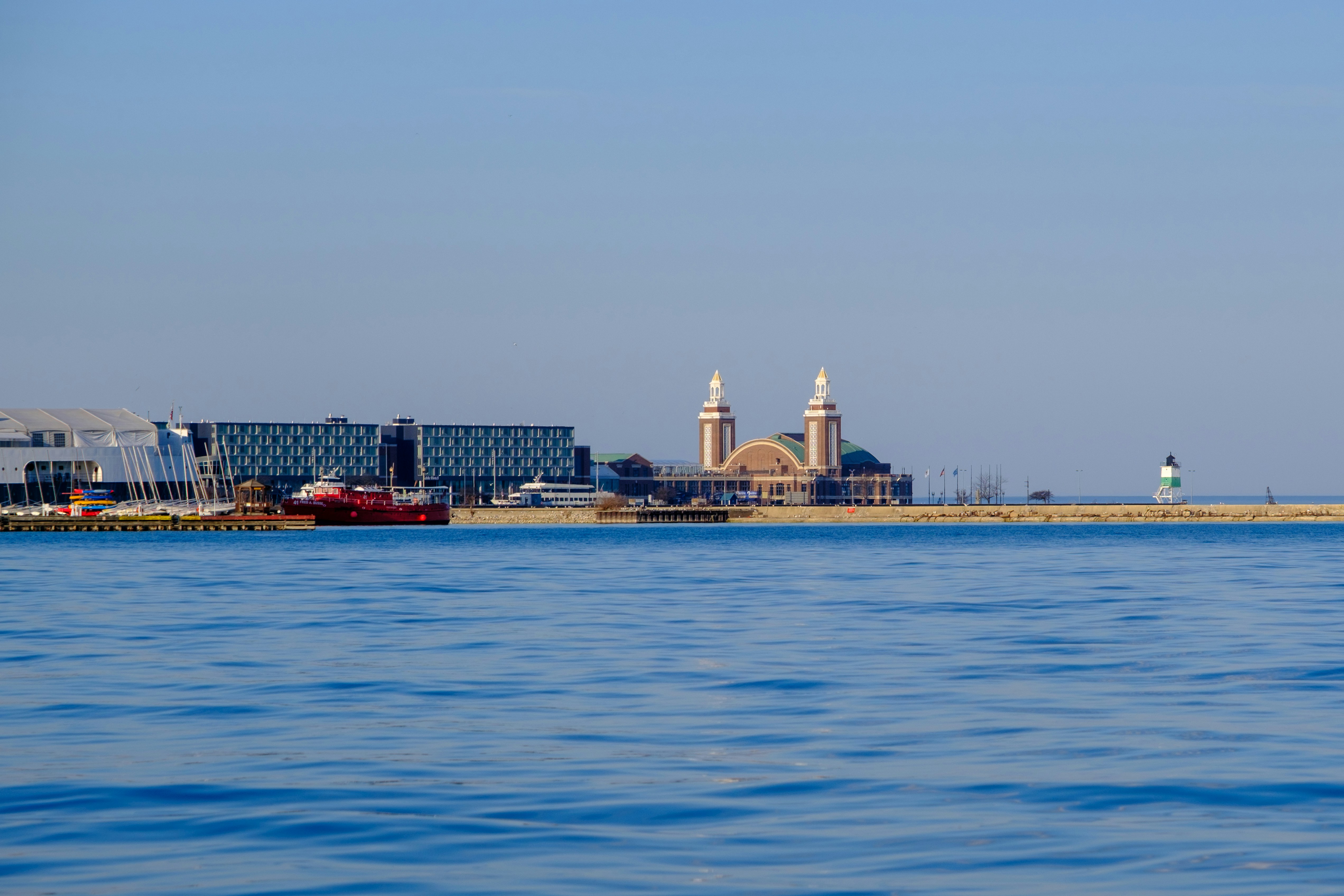 Harbor Silhouette: A Coastal Wake and a Grand Pier