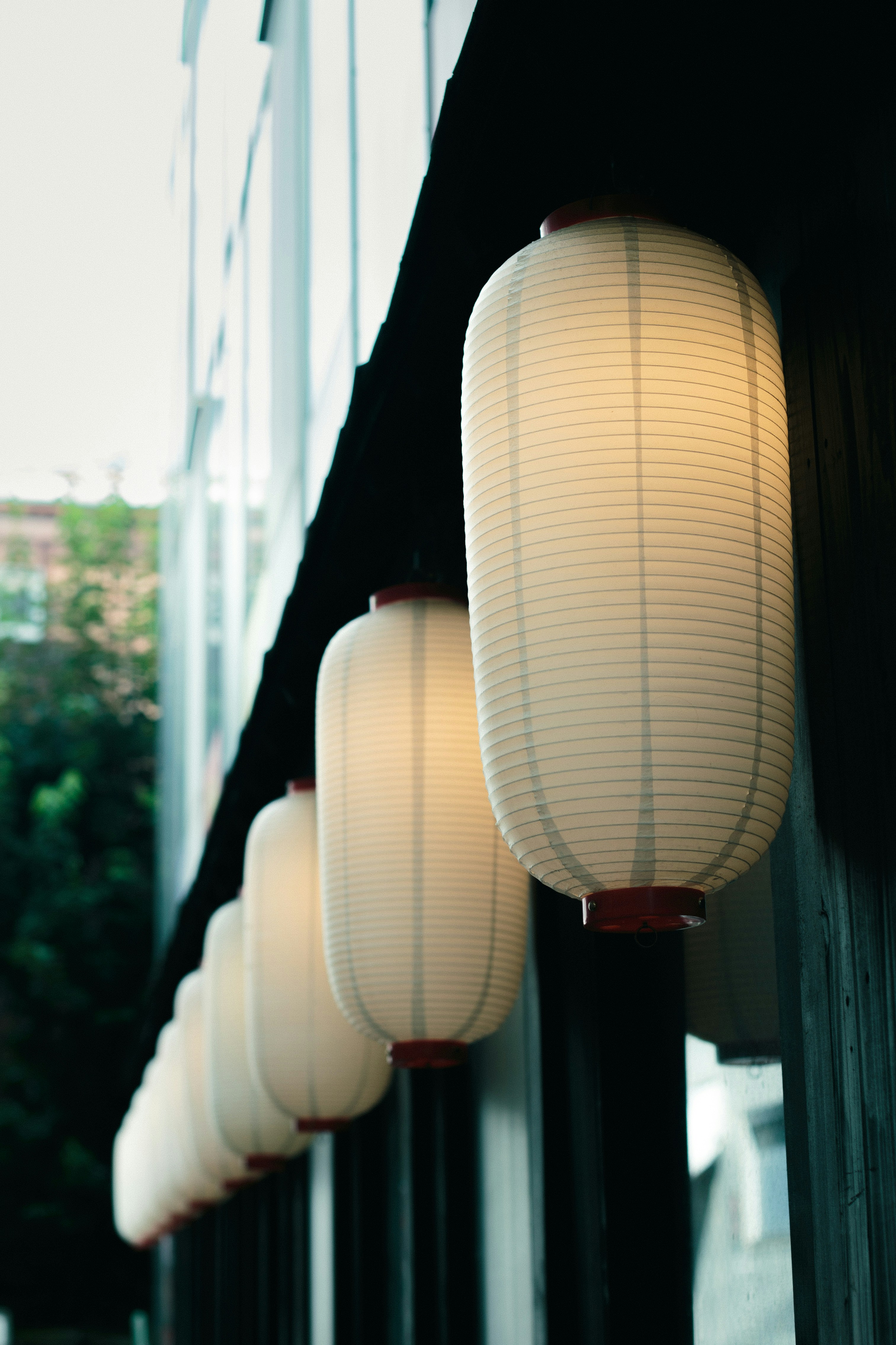 Row of Soft Lanterns Along a Quiet Passage
