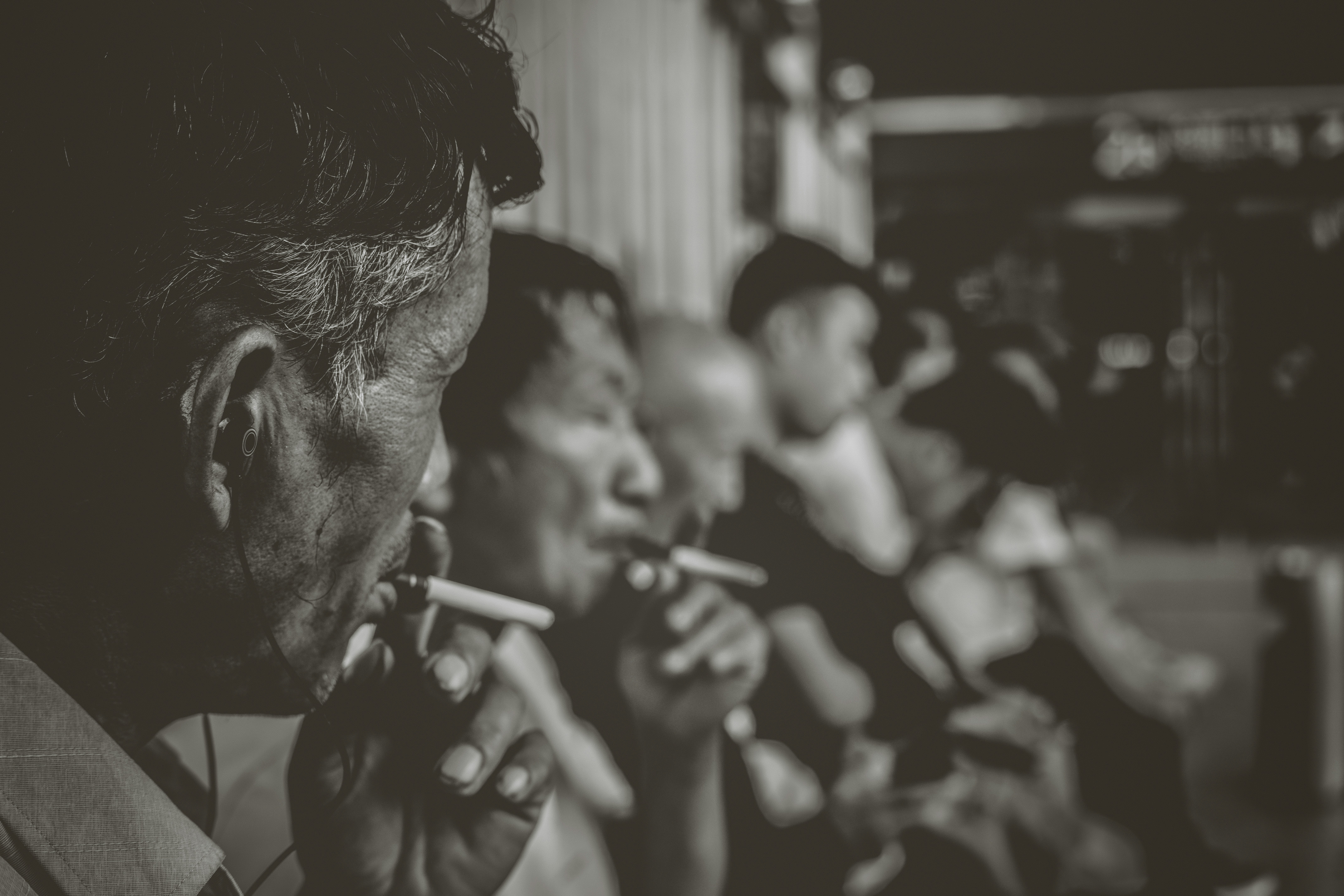 Smoke in the Caffè Line: A Portrait of a Distant Crowd
