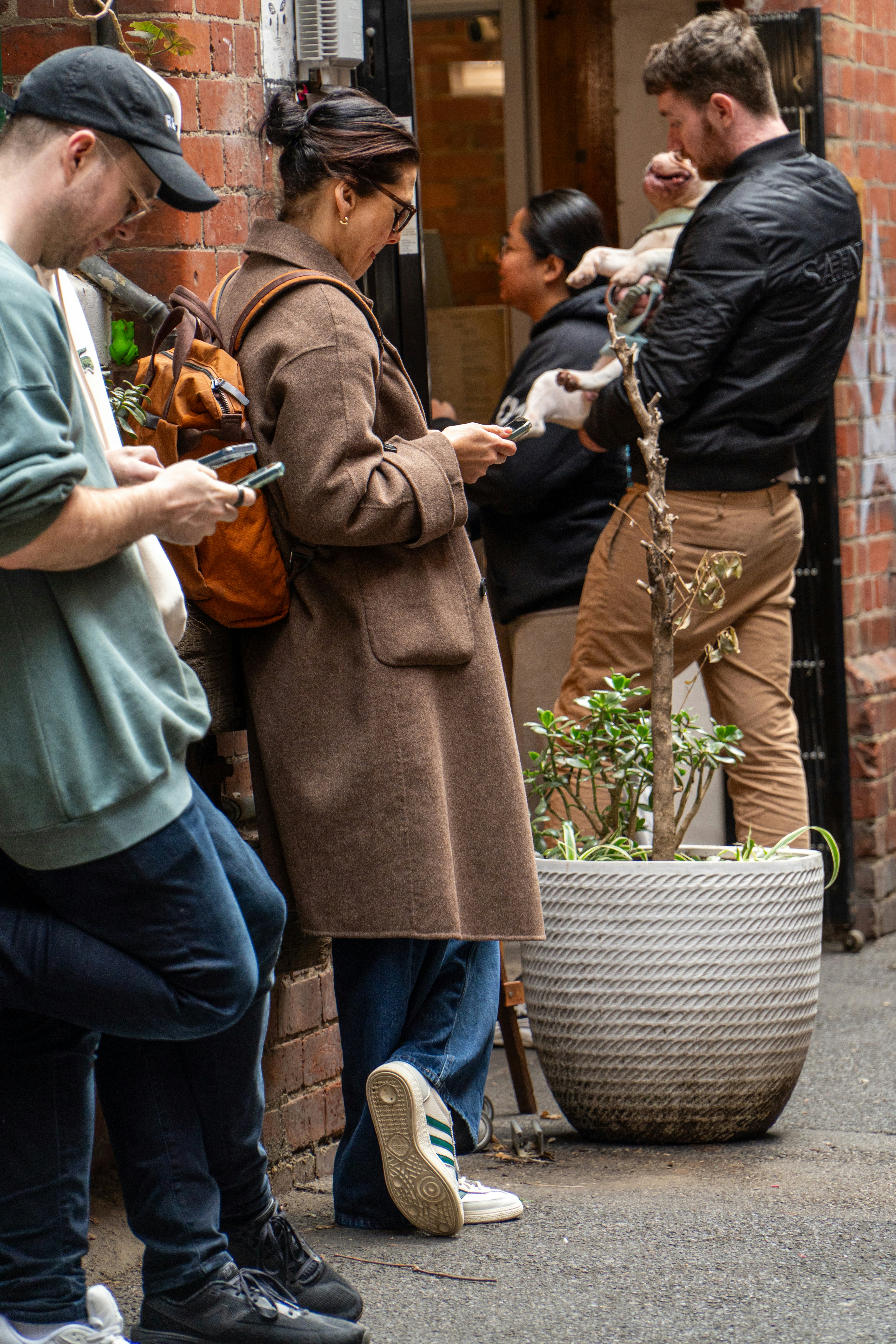 Cozy conversation on a brick-street afternoon