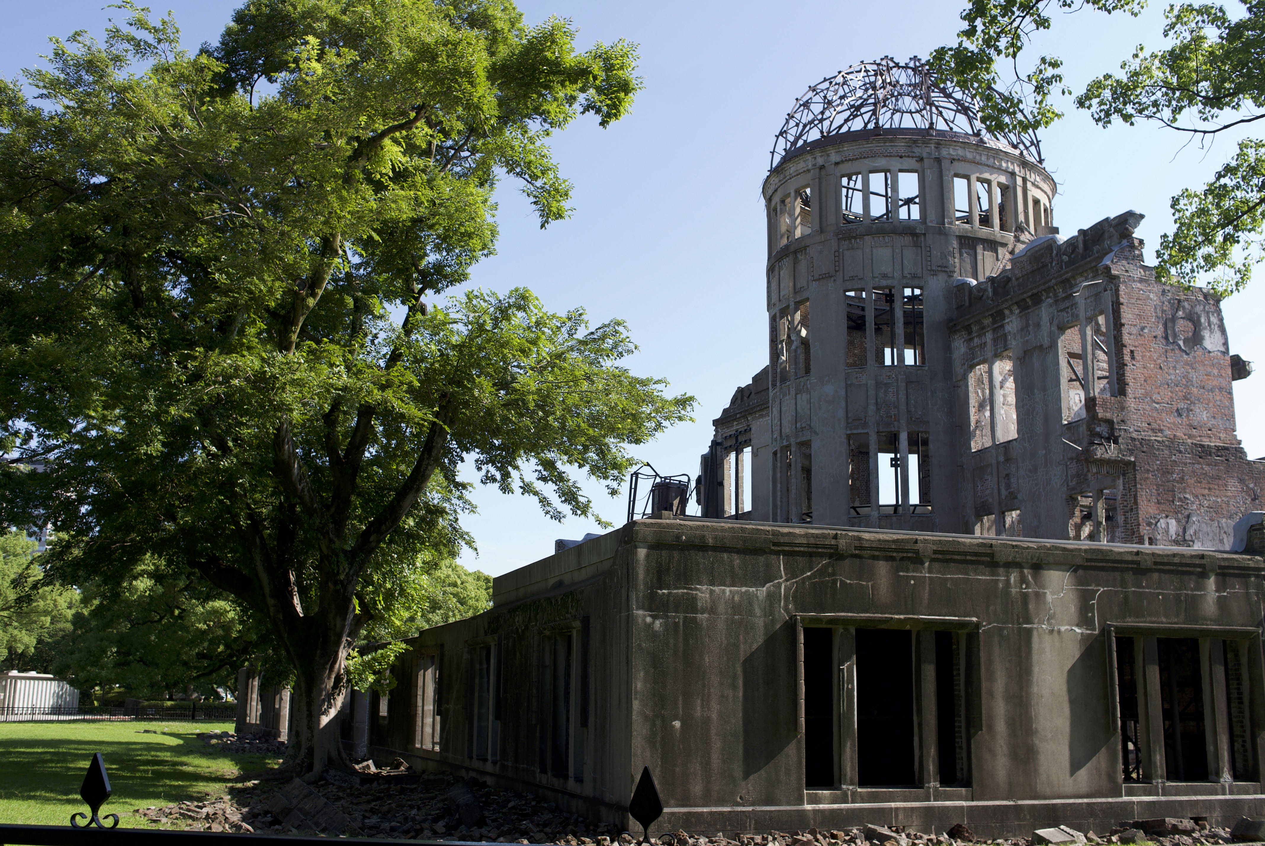 Ruins and Row of Shade: A Sunlit Memory of a War-Torn Structure