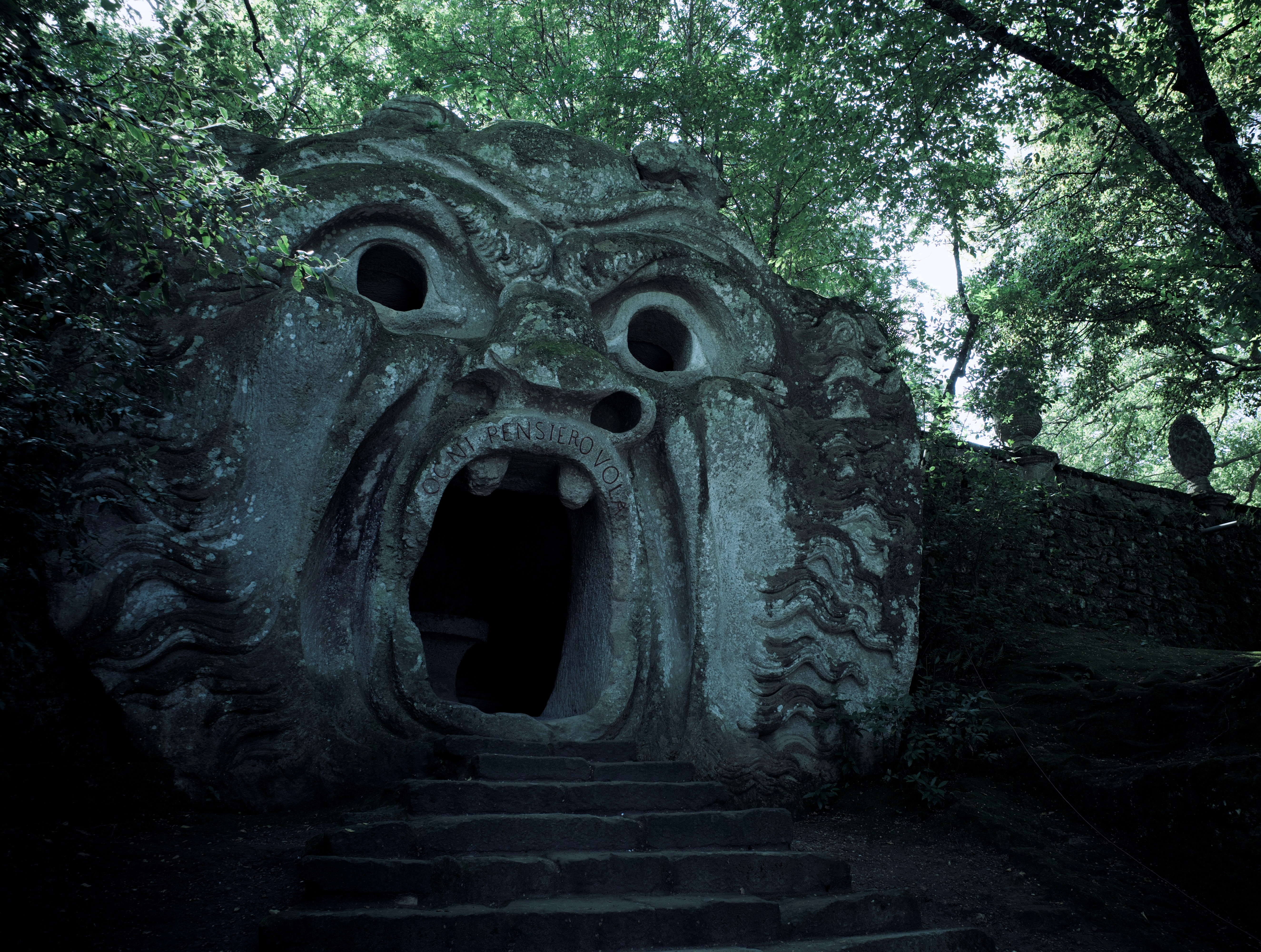 Gargoyle Gate: A Grotesque Portal Between Trees