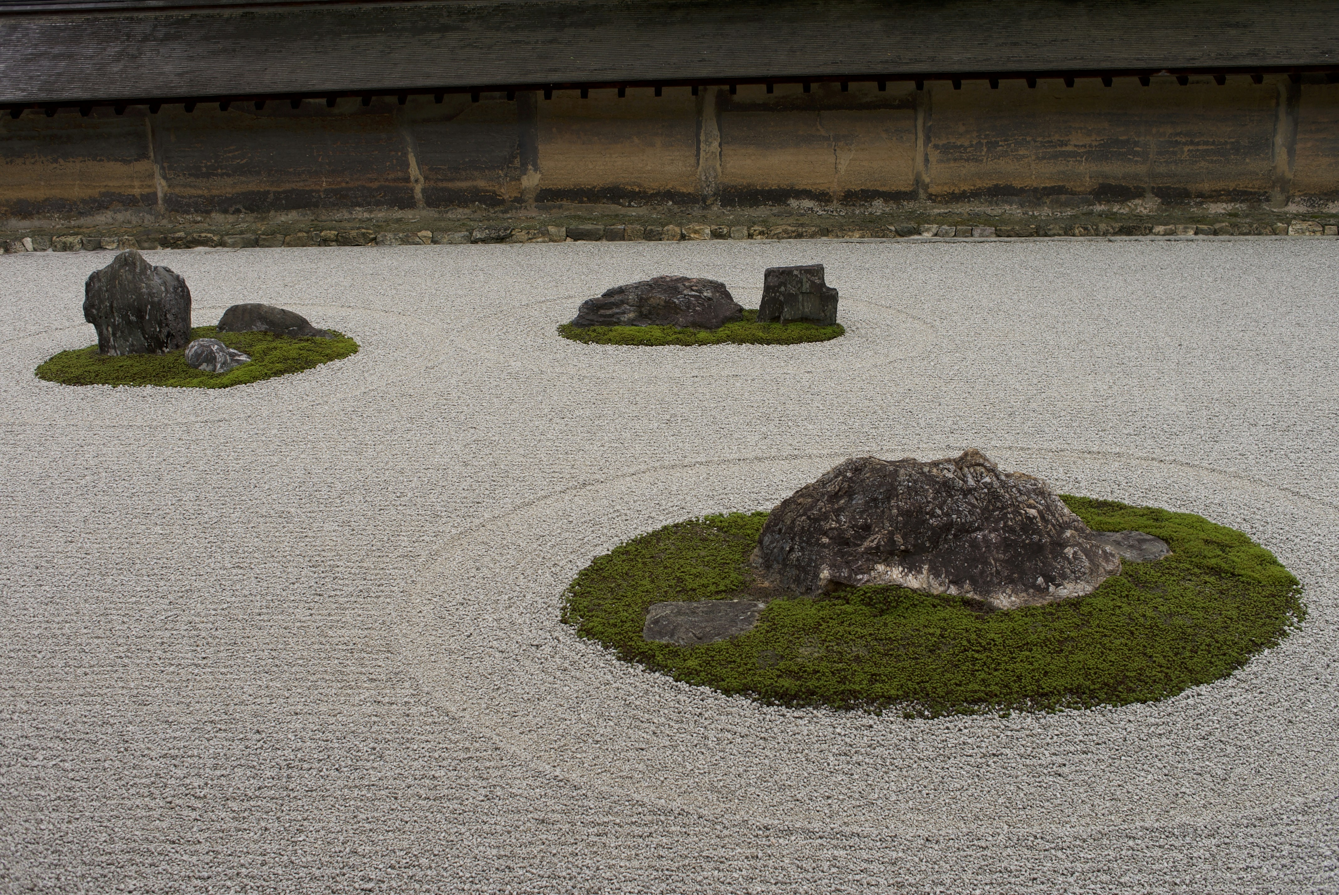 Raked Gravel and Moss Circles: Zen Stones in Quiet Arrangement