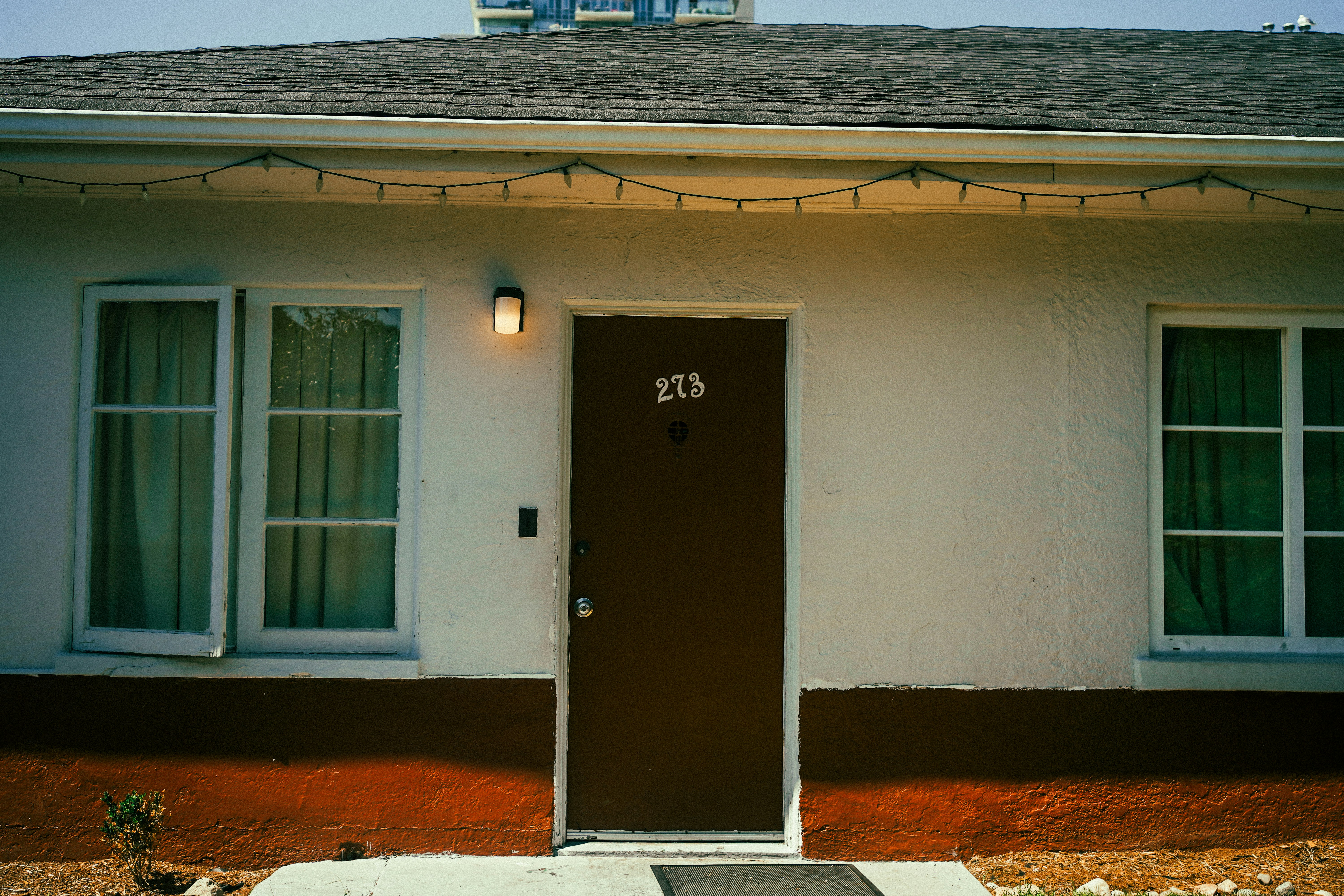 Central Doorway in a Sunny Cottage Facade