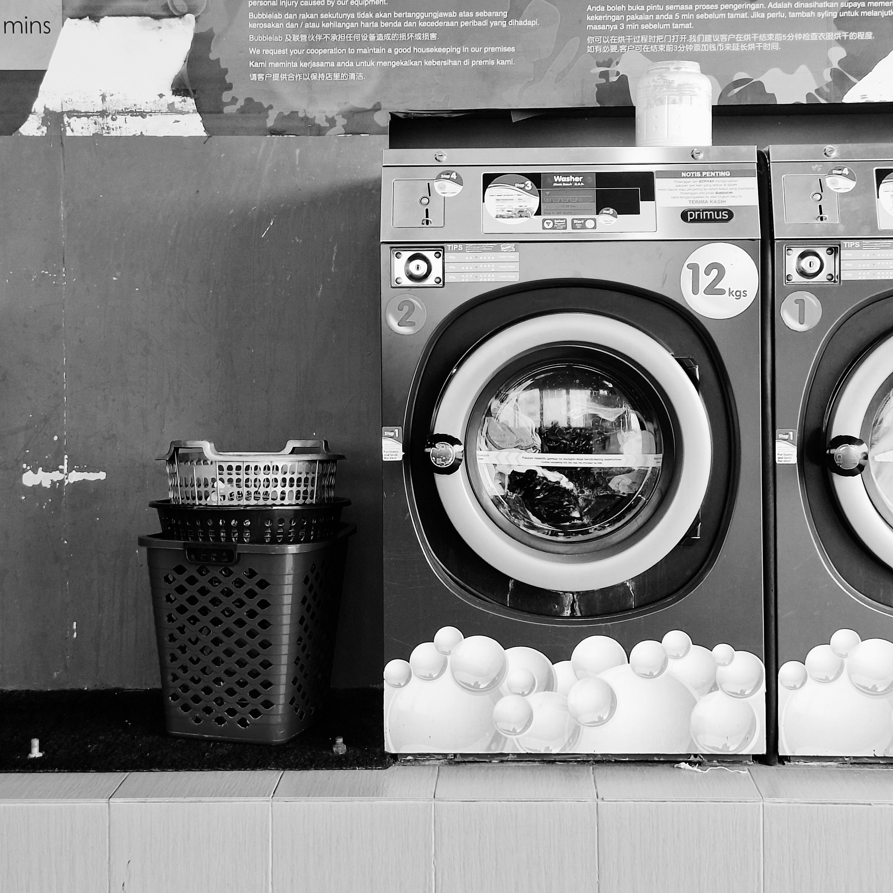 Symmetry of Spin: Front-Loaders and Bubbles in a Quiet Laundry Corner