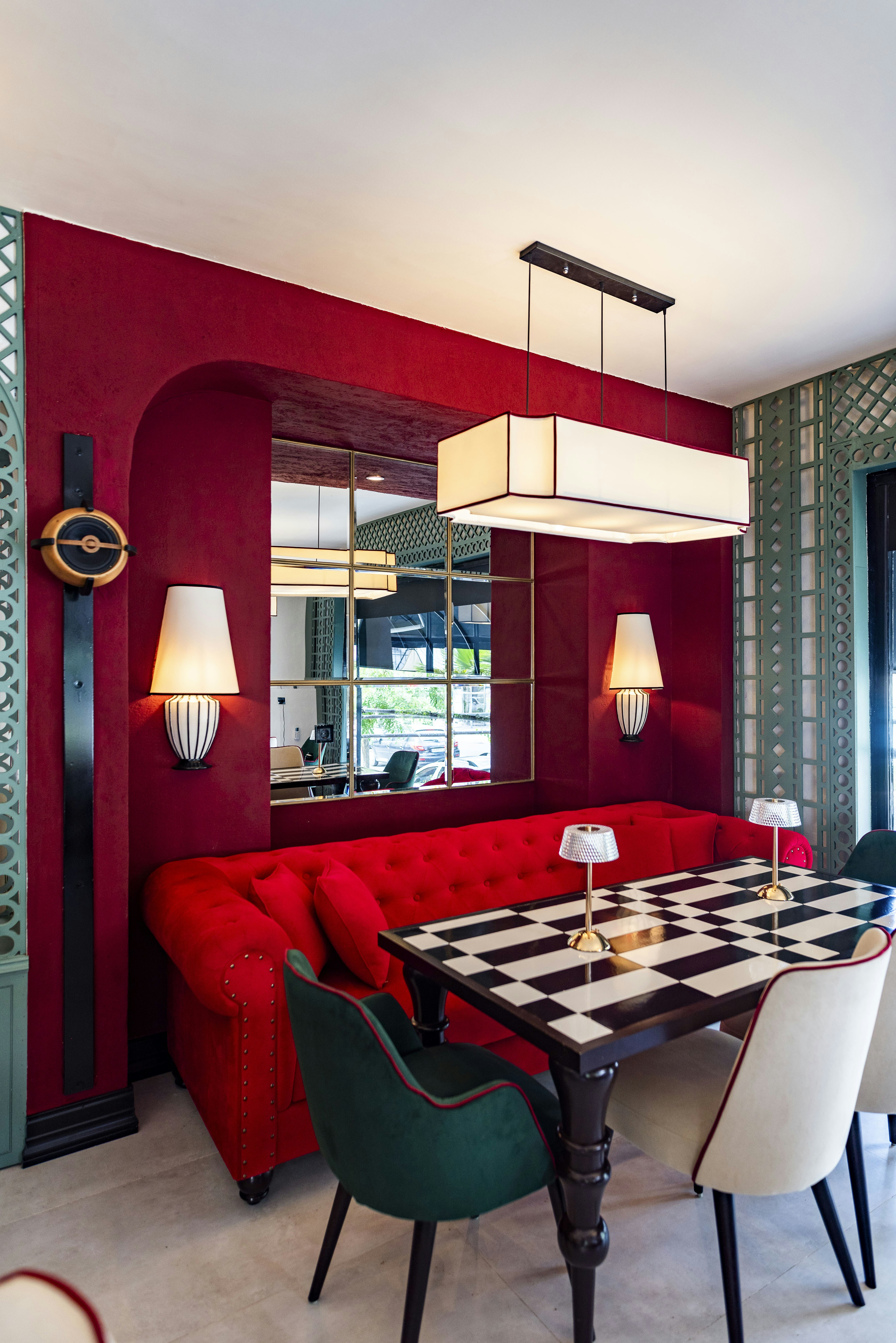 Checkerboard Table, Crimson Nook: A Lounge with Retro Flair