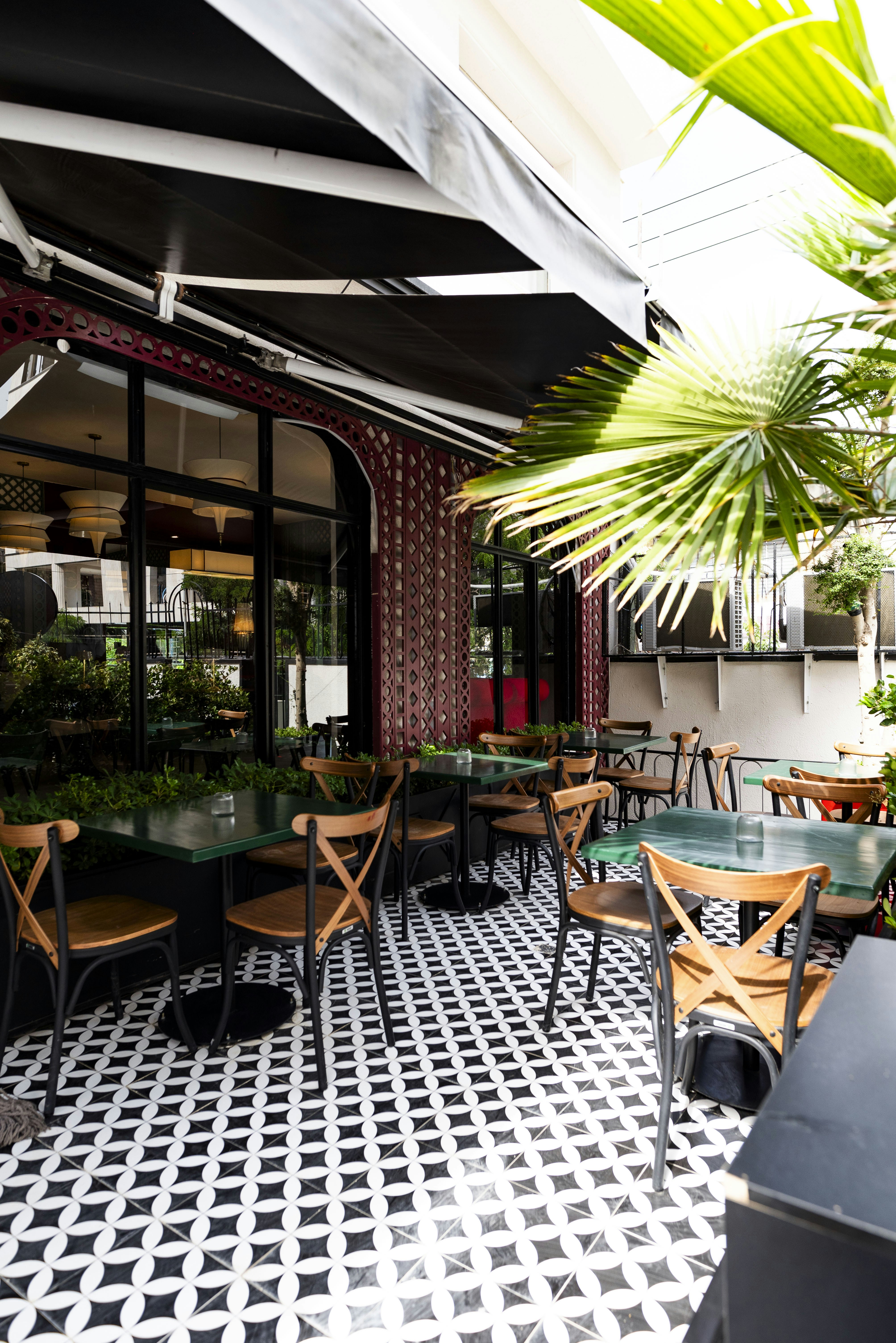 Urban Café Terrace with Geometric Tile Grounding