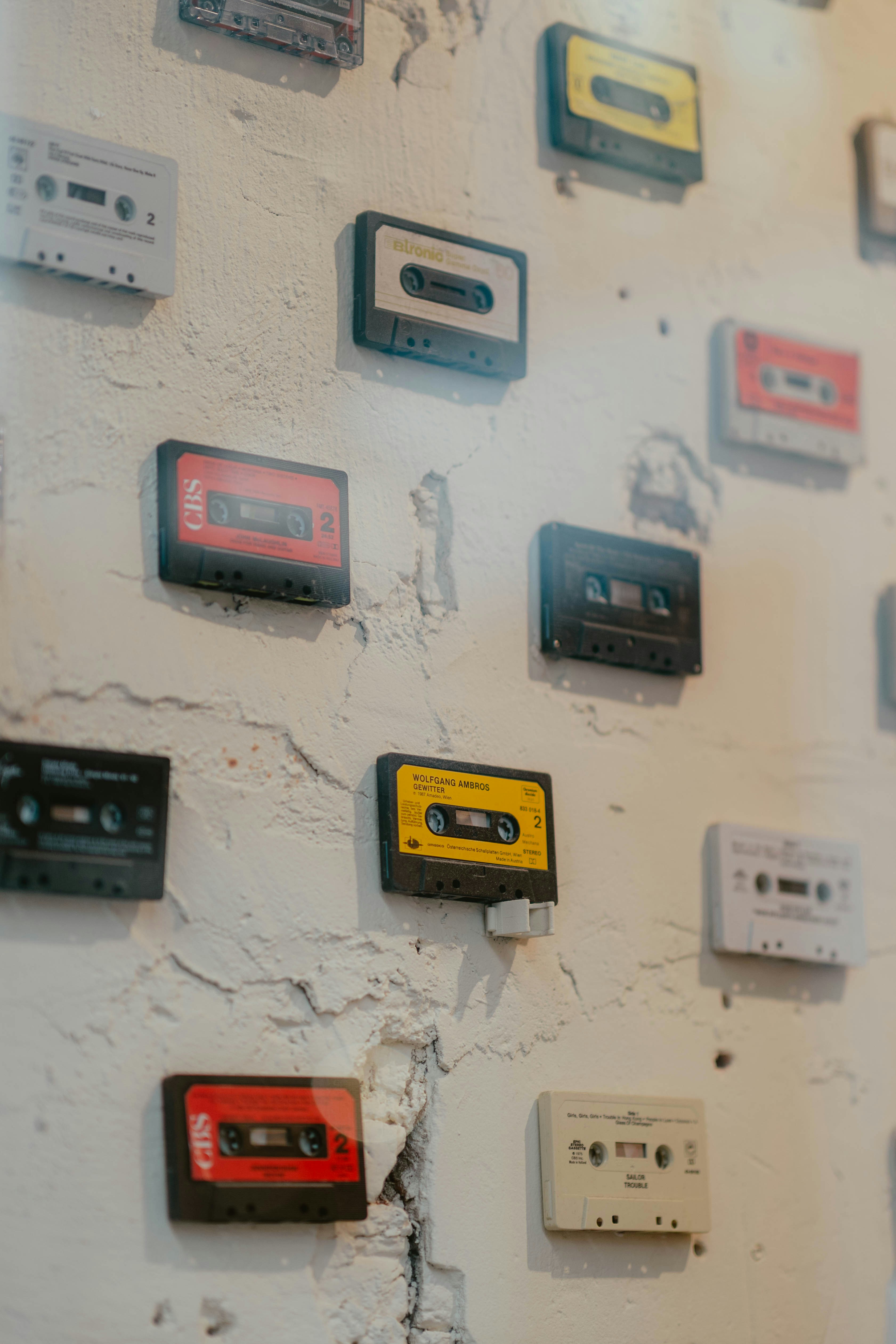 A Wall of Retro Cassettes: Colorful Time Capsules on Concrete