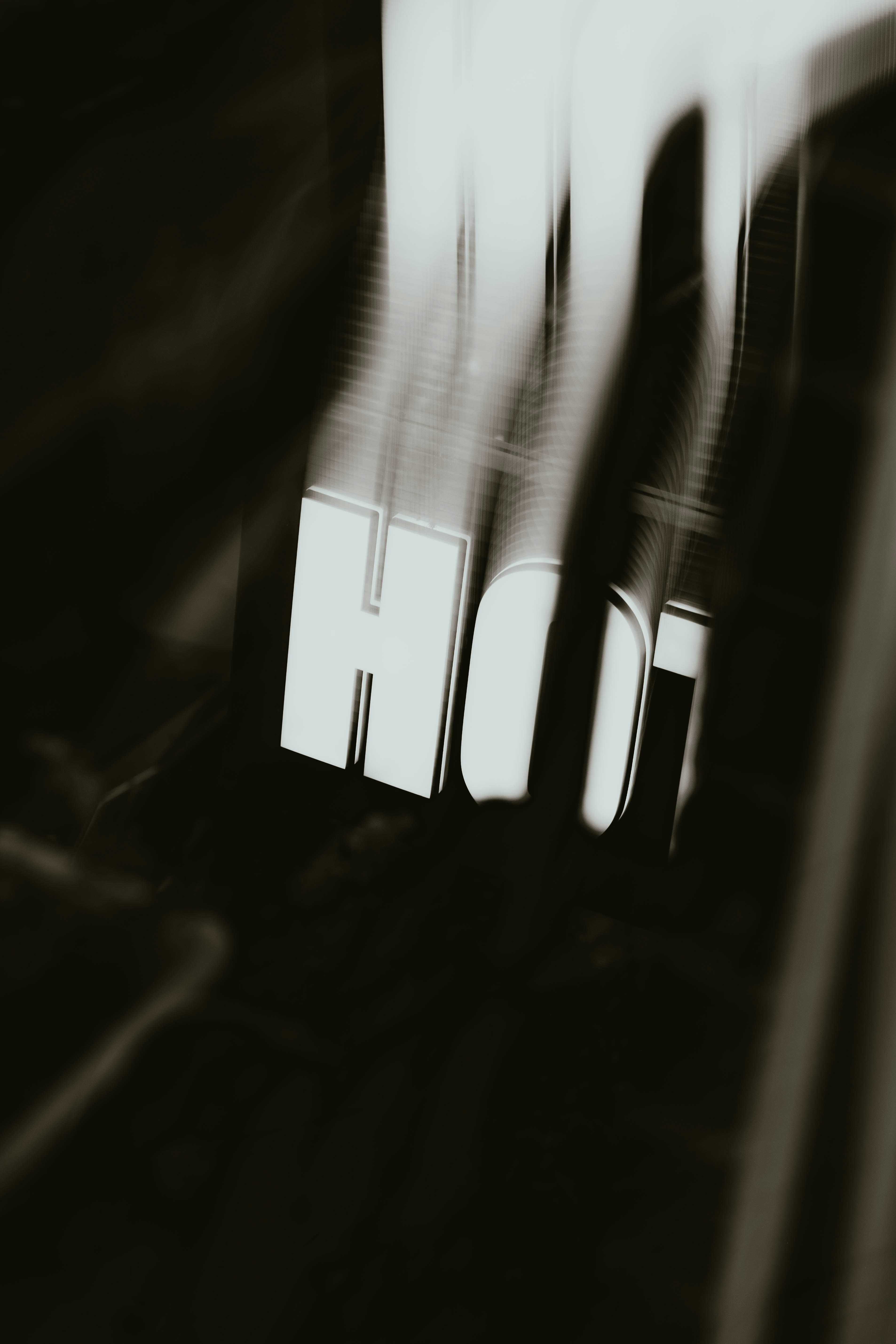 Monochrome Motion: Abstract Light and Shadow on a Risque Edge