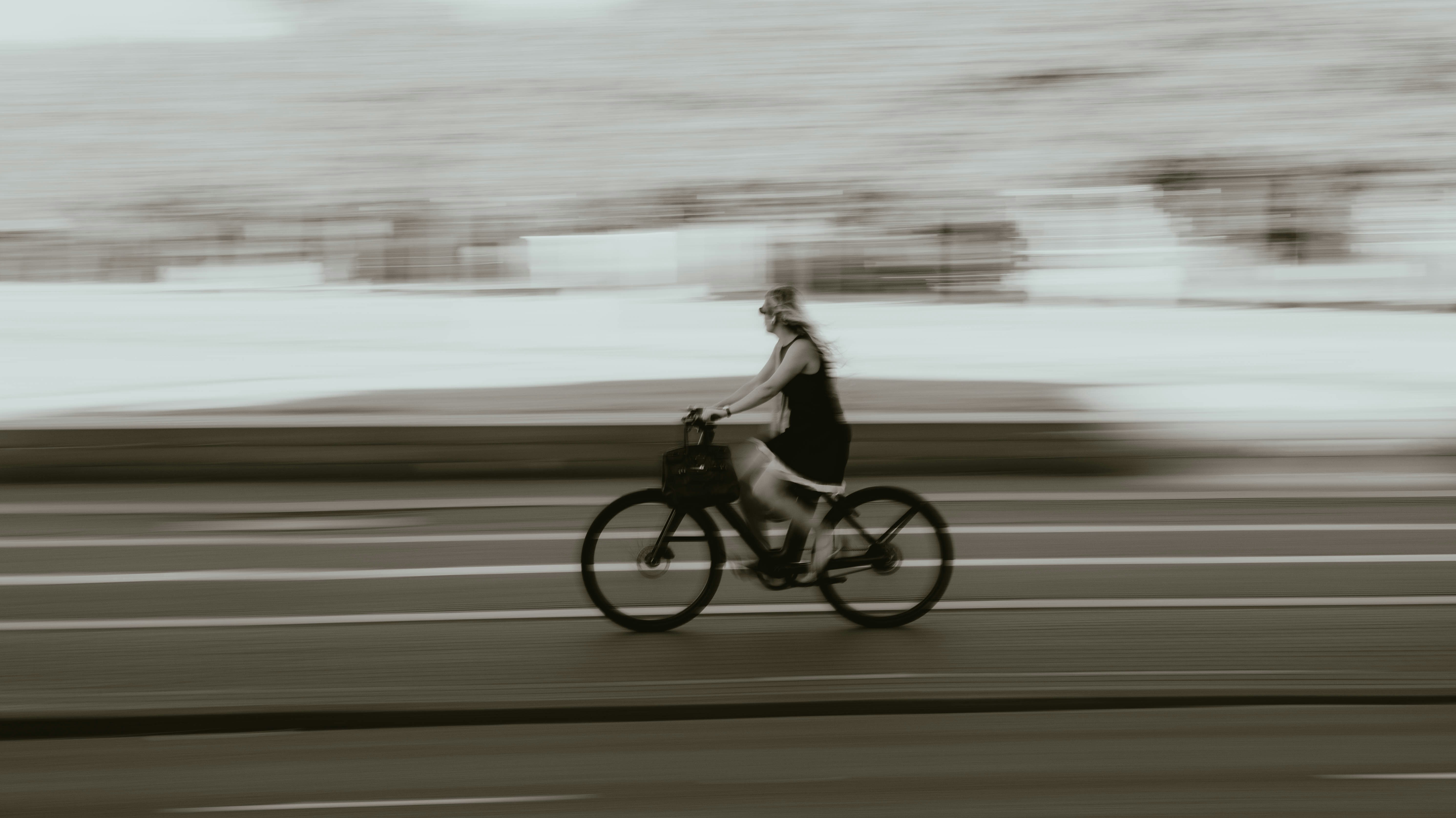 Blurred Motion, Quiet Ride: A Cyclist Sketches Through a Blurred Street