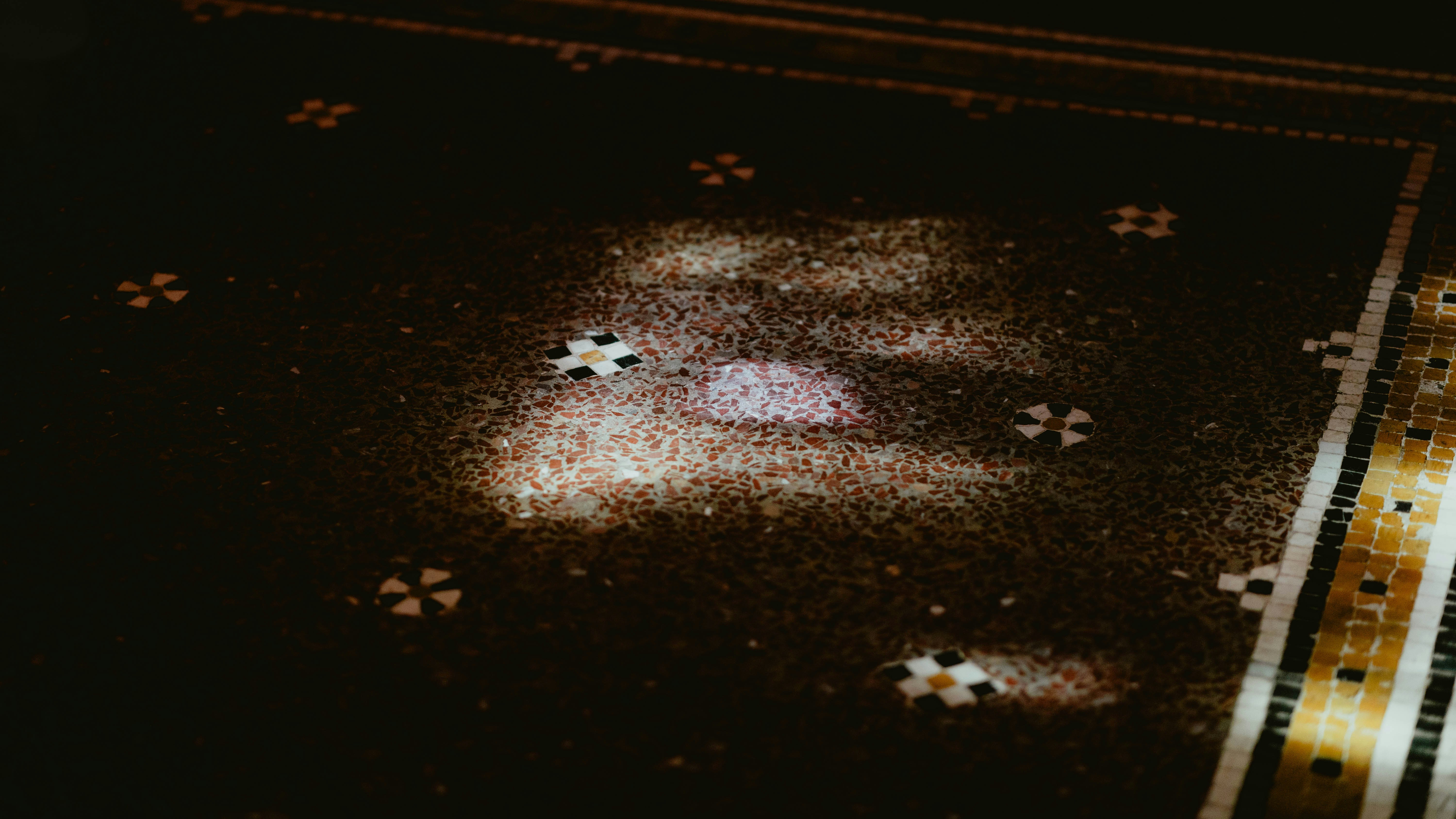 Nighttime Mosaic: A Central Glow in a Quiet Courtyard