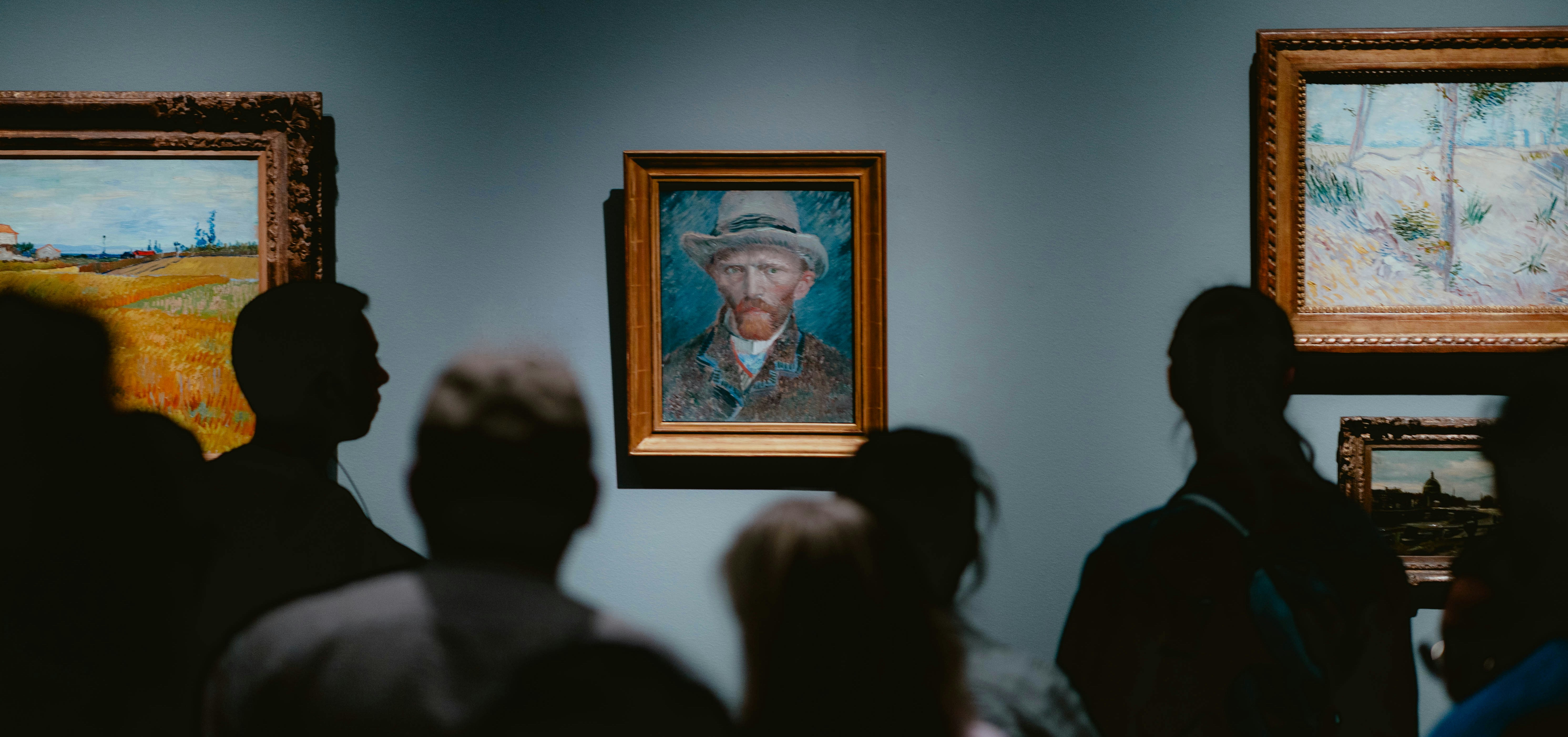 Silent Gaze: Portraits in a Shadowed Gallery
