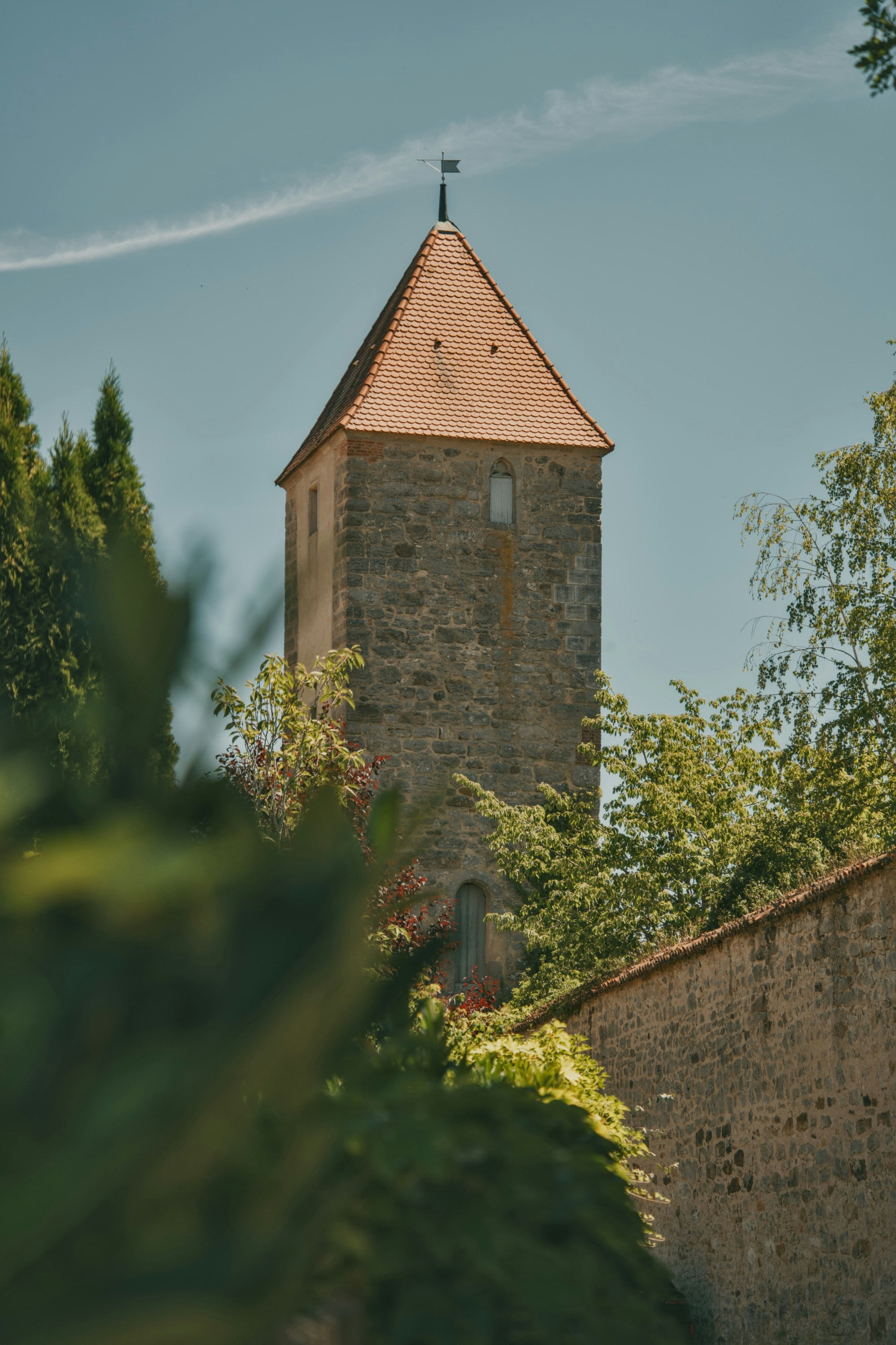 Stone Watchtower Reaching Toward a Clear Sky