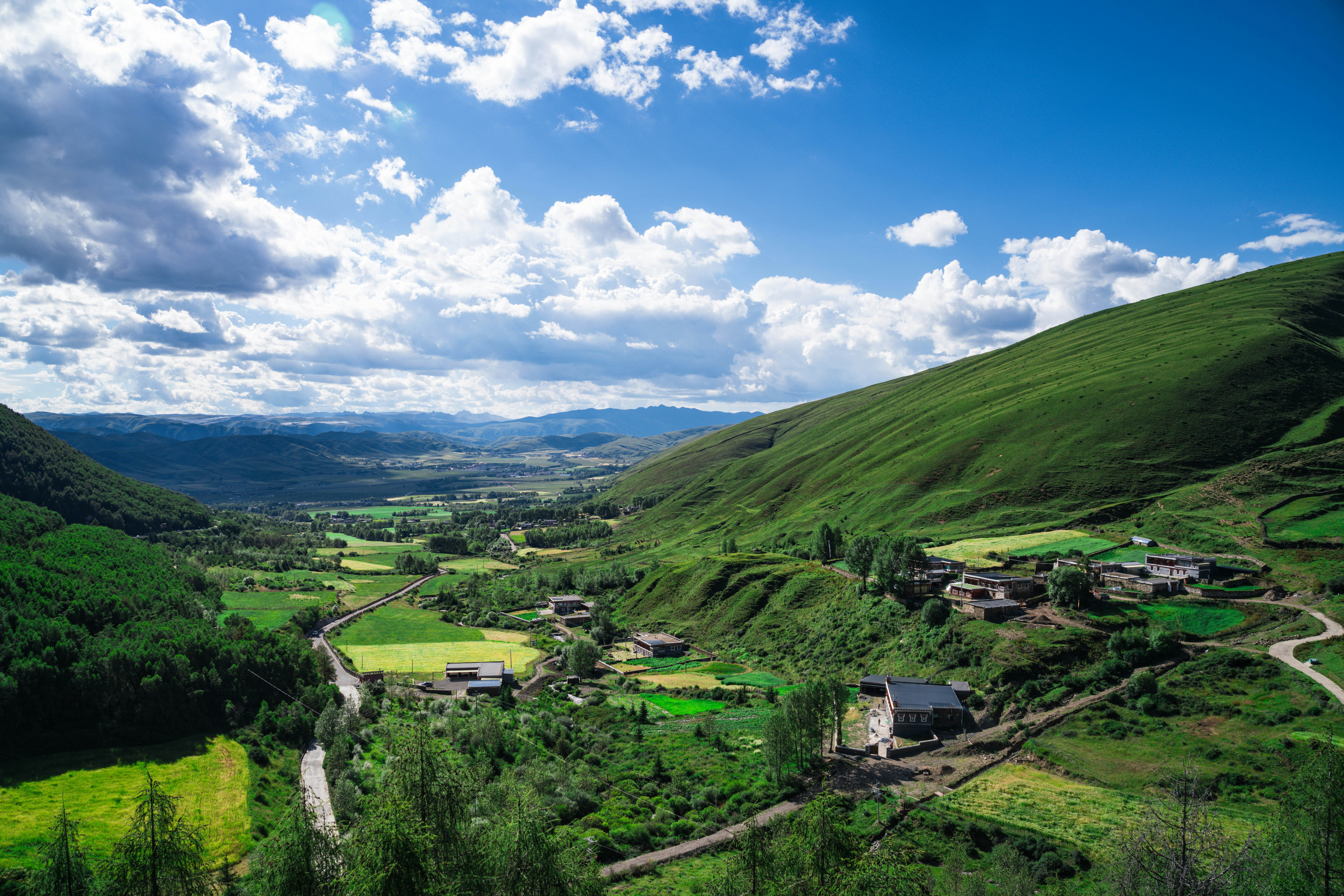 Green Valley Villages Beneath a Painted Sky