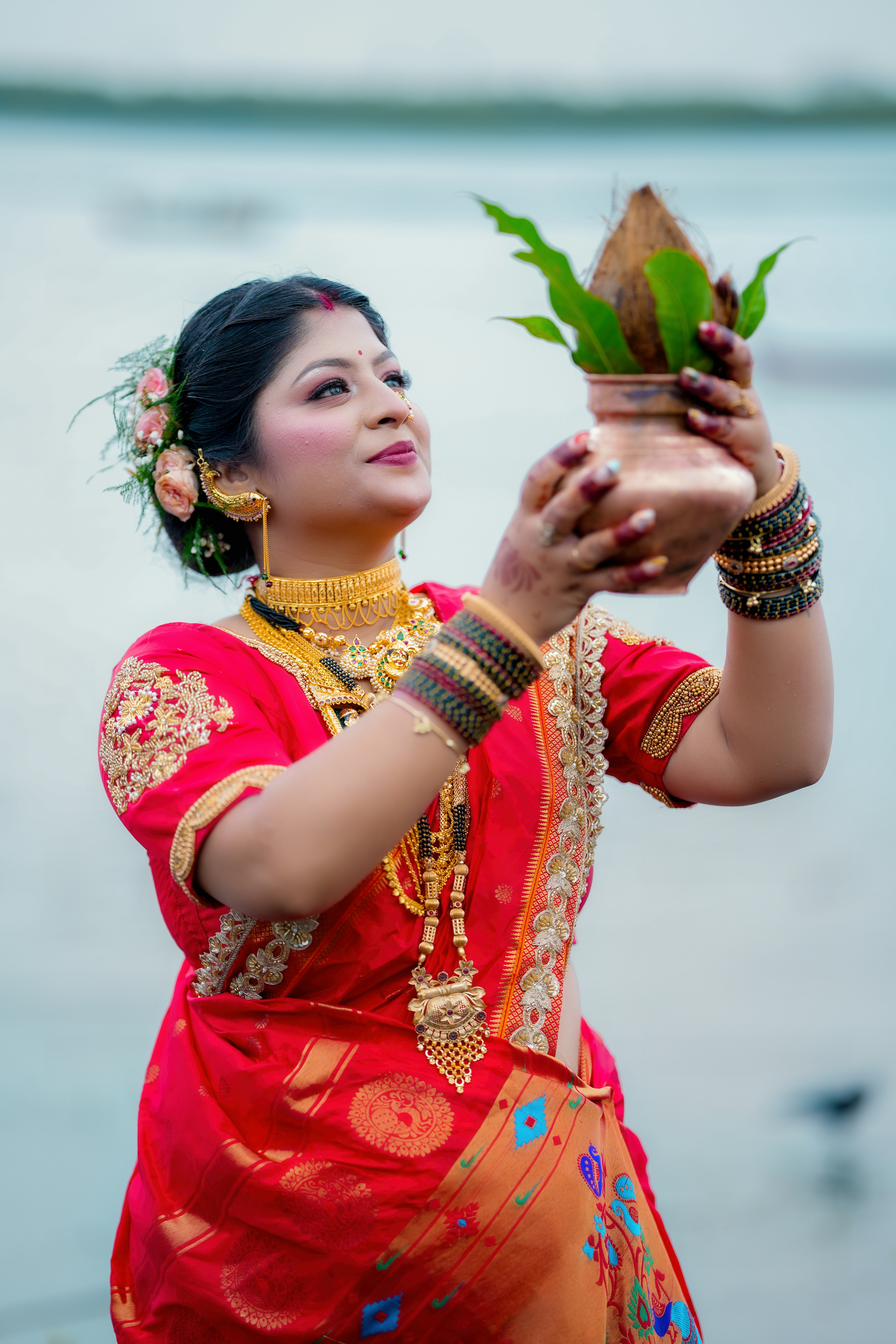 Priestess in Red: Offering a Copper Vessel at the Shore