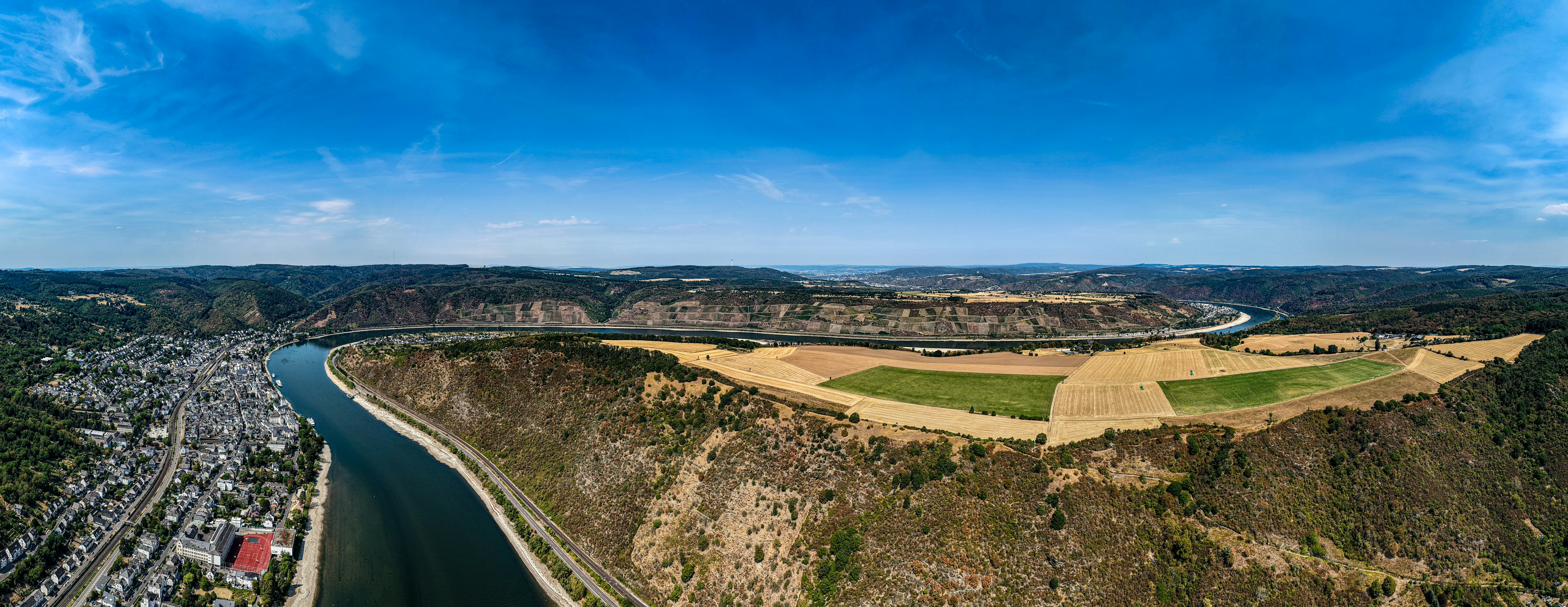 Aerial Panorama of a River Gorge Winding Through a Green-Valley Plateau