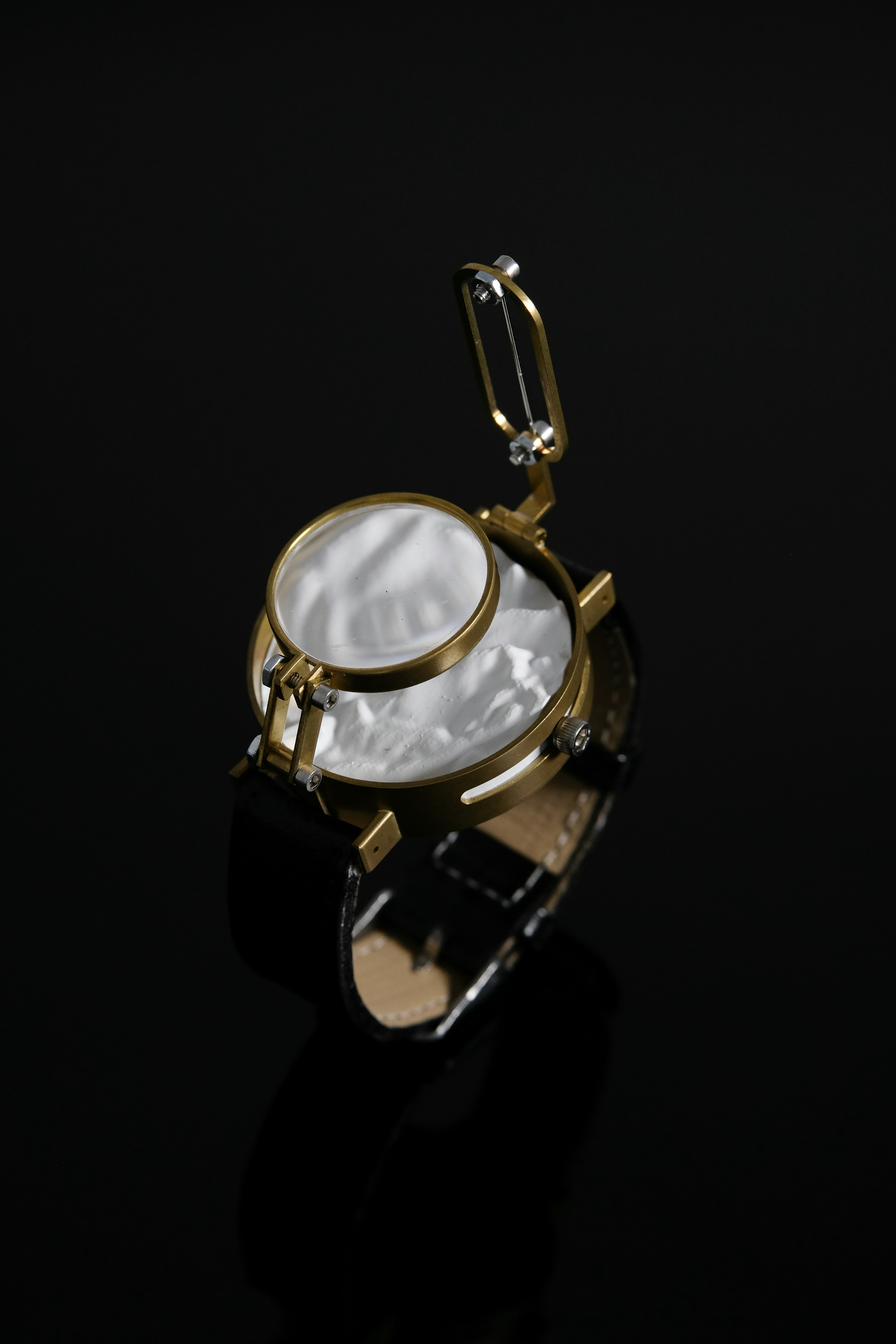 Open Heart: A Gold-Gilded Timepiece Unfolds on Velvet Night