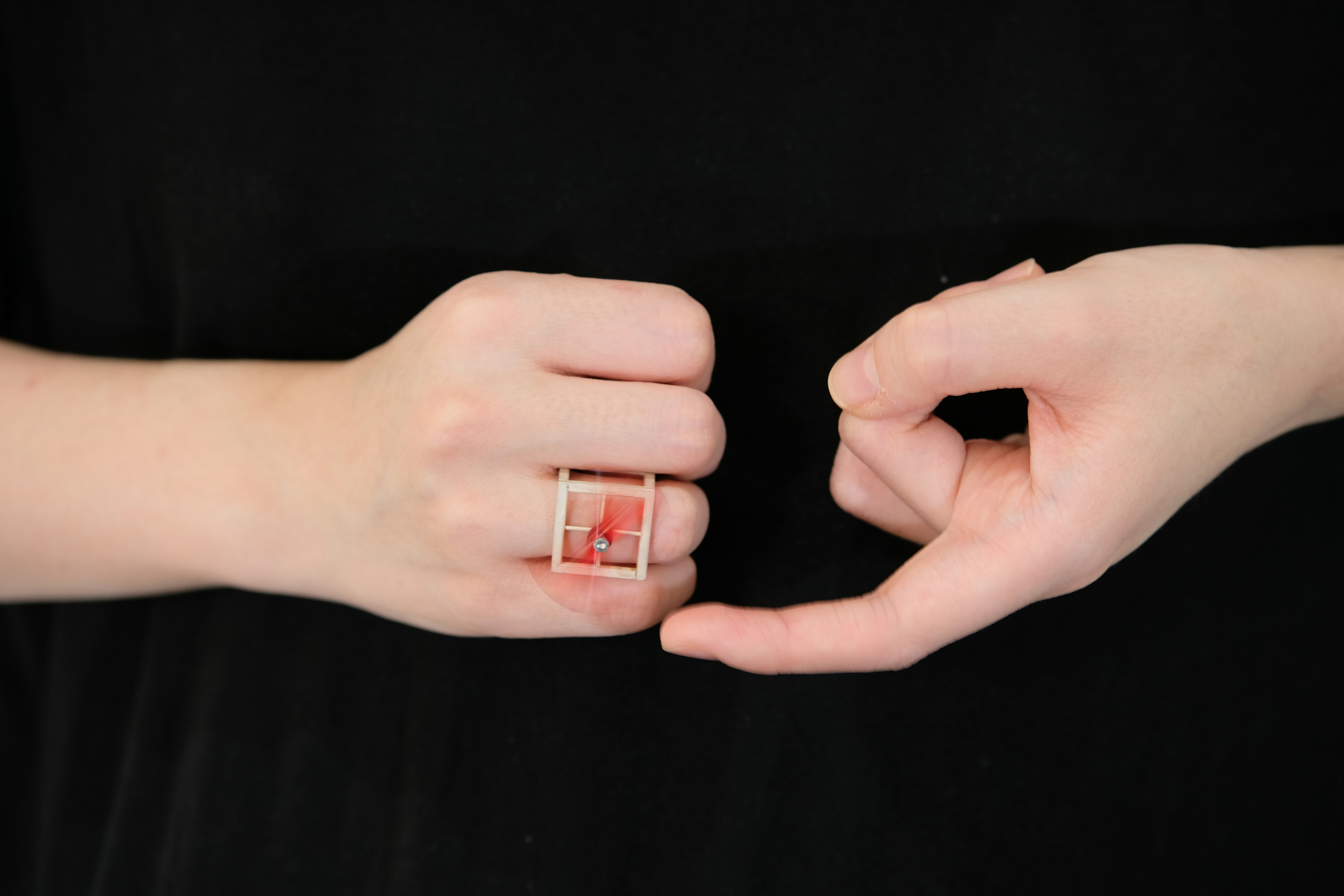 Close-up of a Hand Ring Containing a Tiny Object