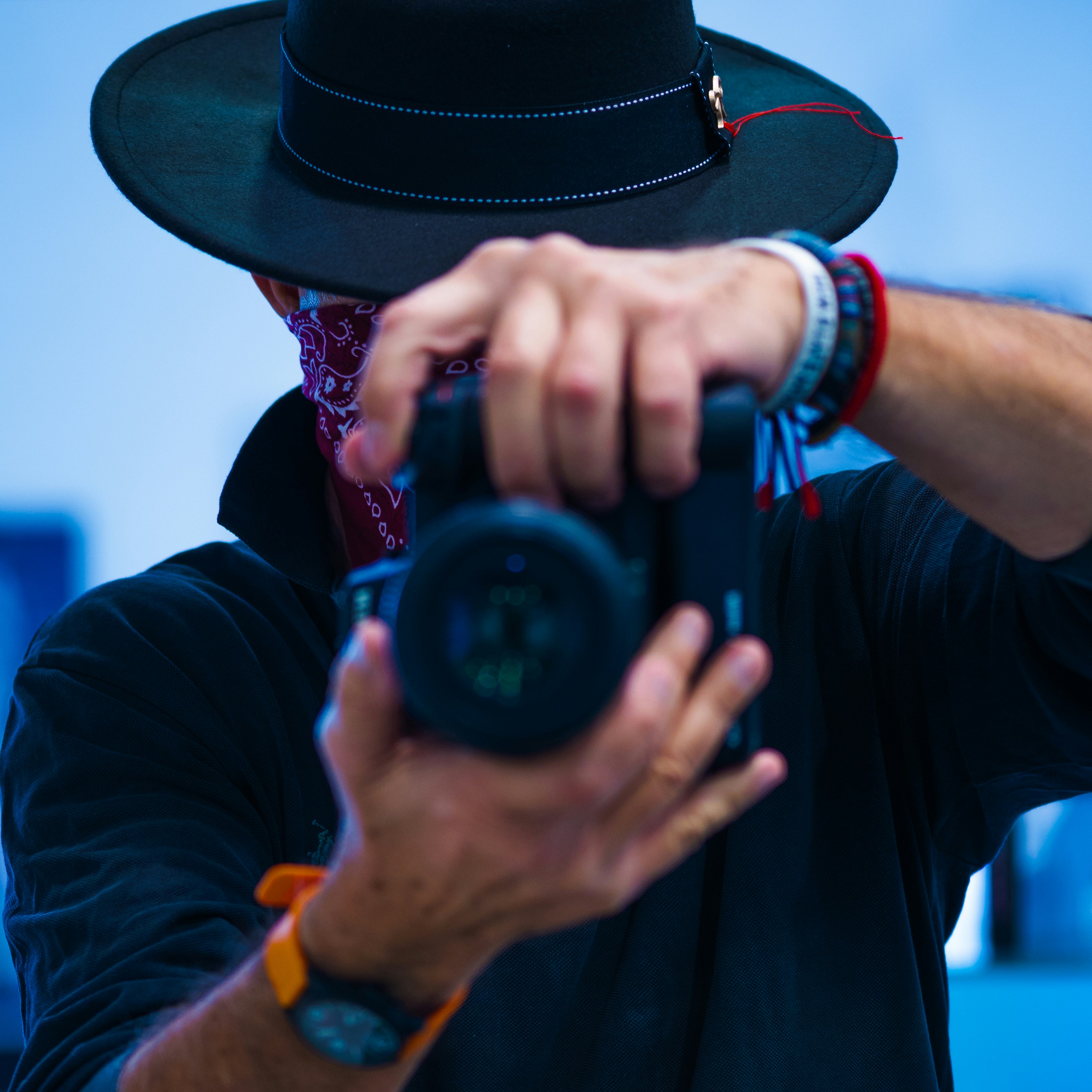 Behind the Lens: Focus on the Masked Photographer