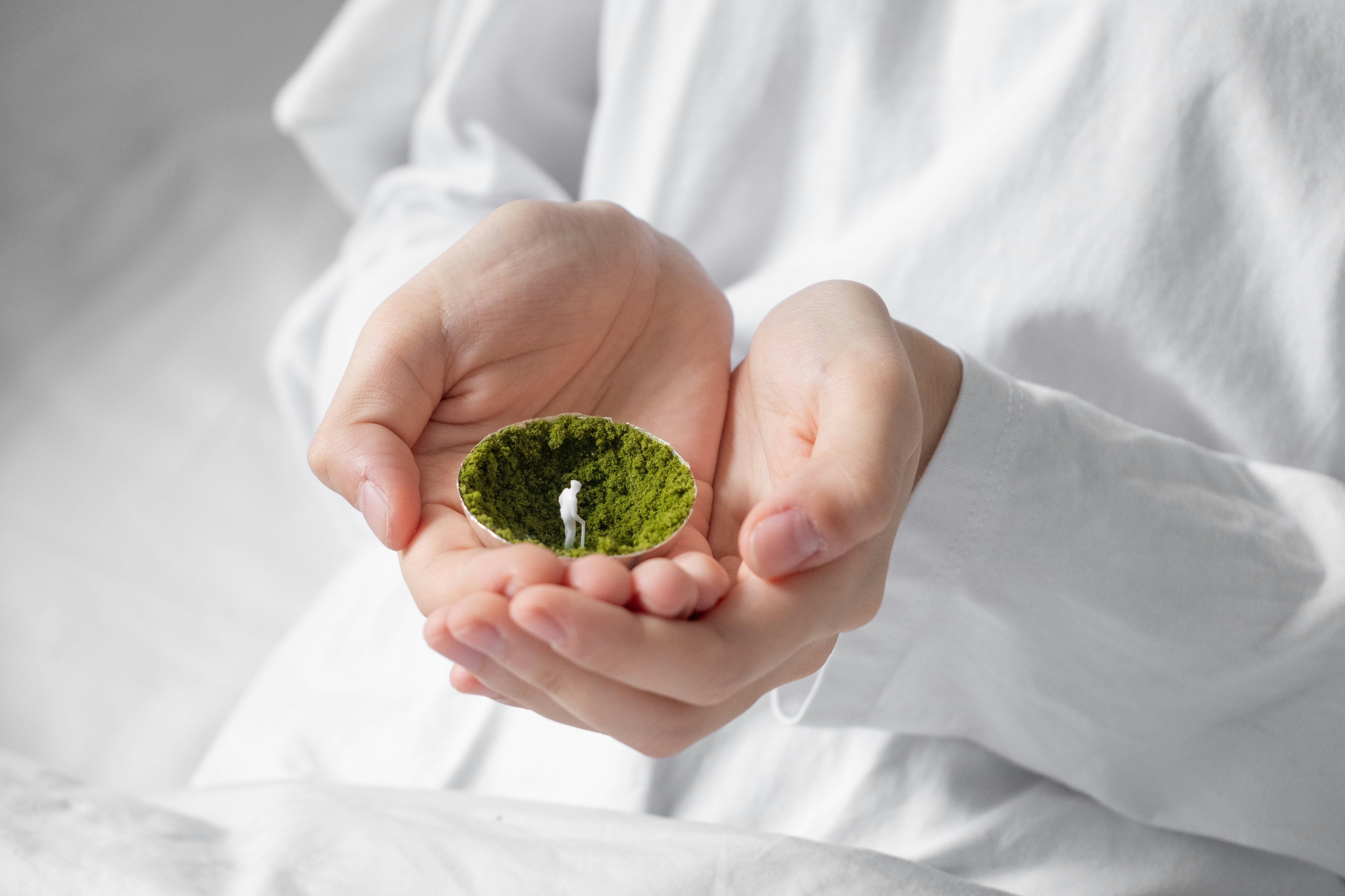 Green Moss Chip: A Gentle Moment in White Linen