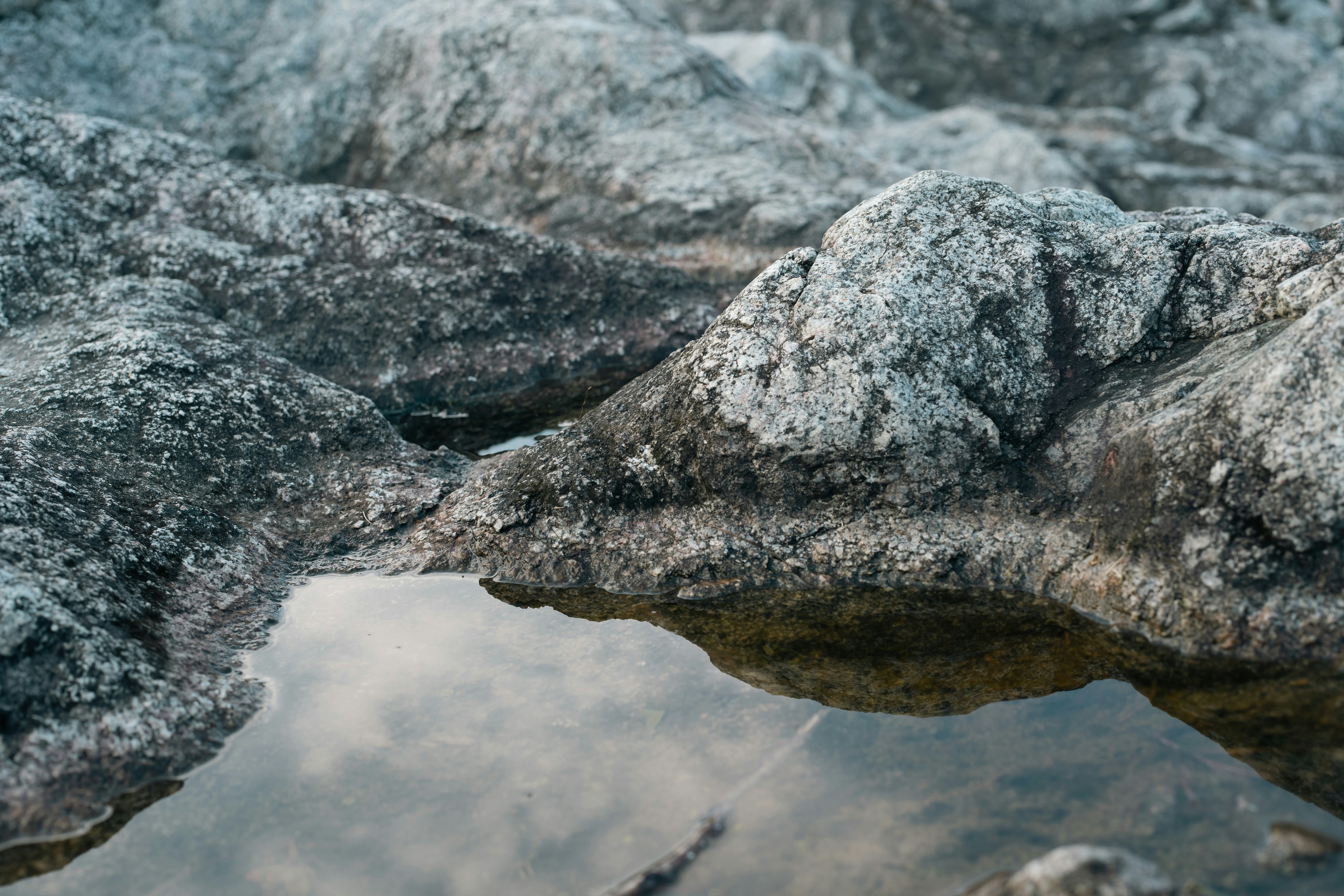 Liquid Mirror Between Weathered Granite