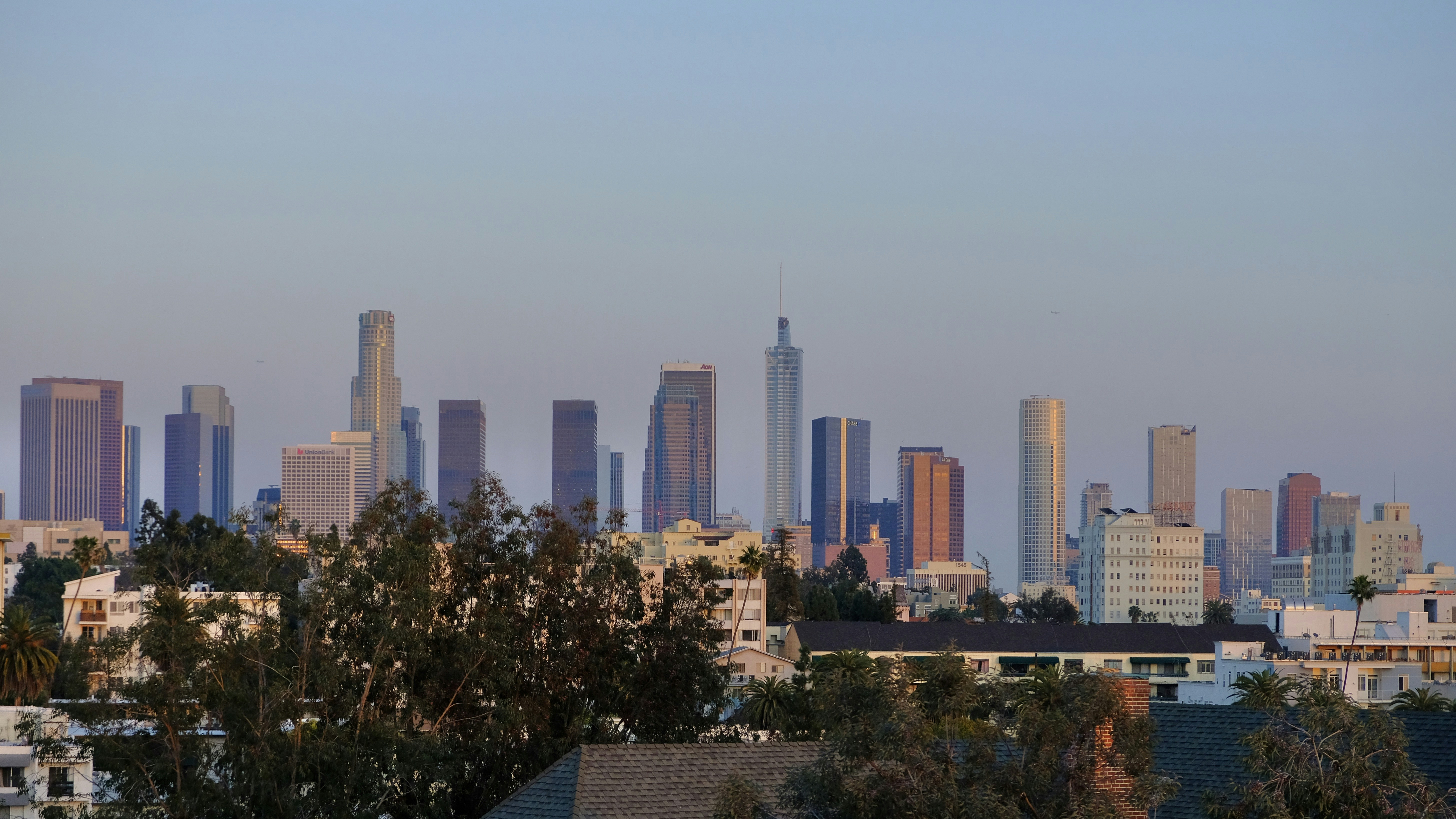 Dawn Glimmer over a Mid-City Skyline