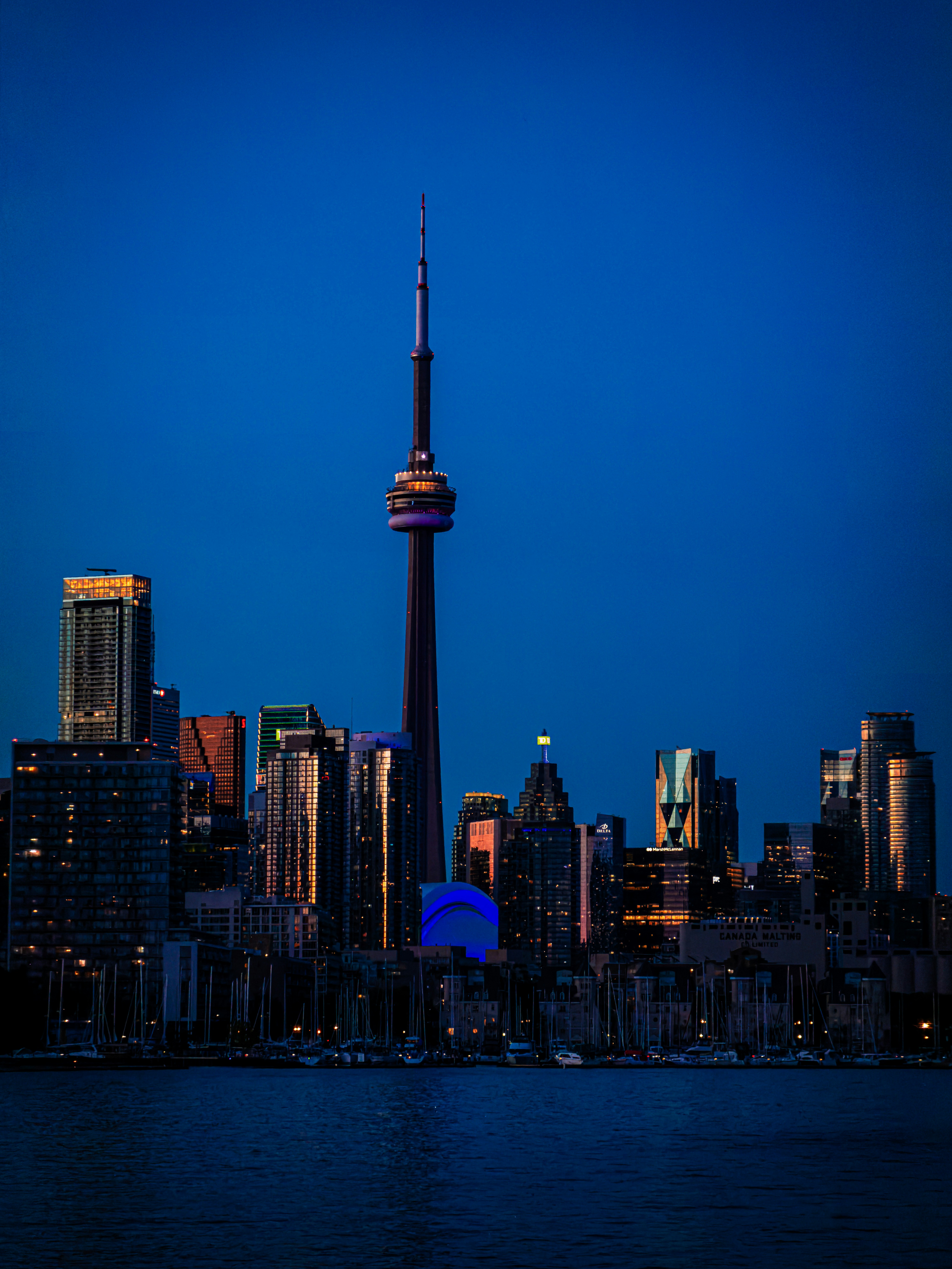 Toronto Skyline at Dusk: CN Tower Pierces a Velvet Blue