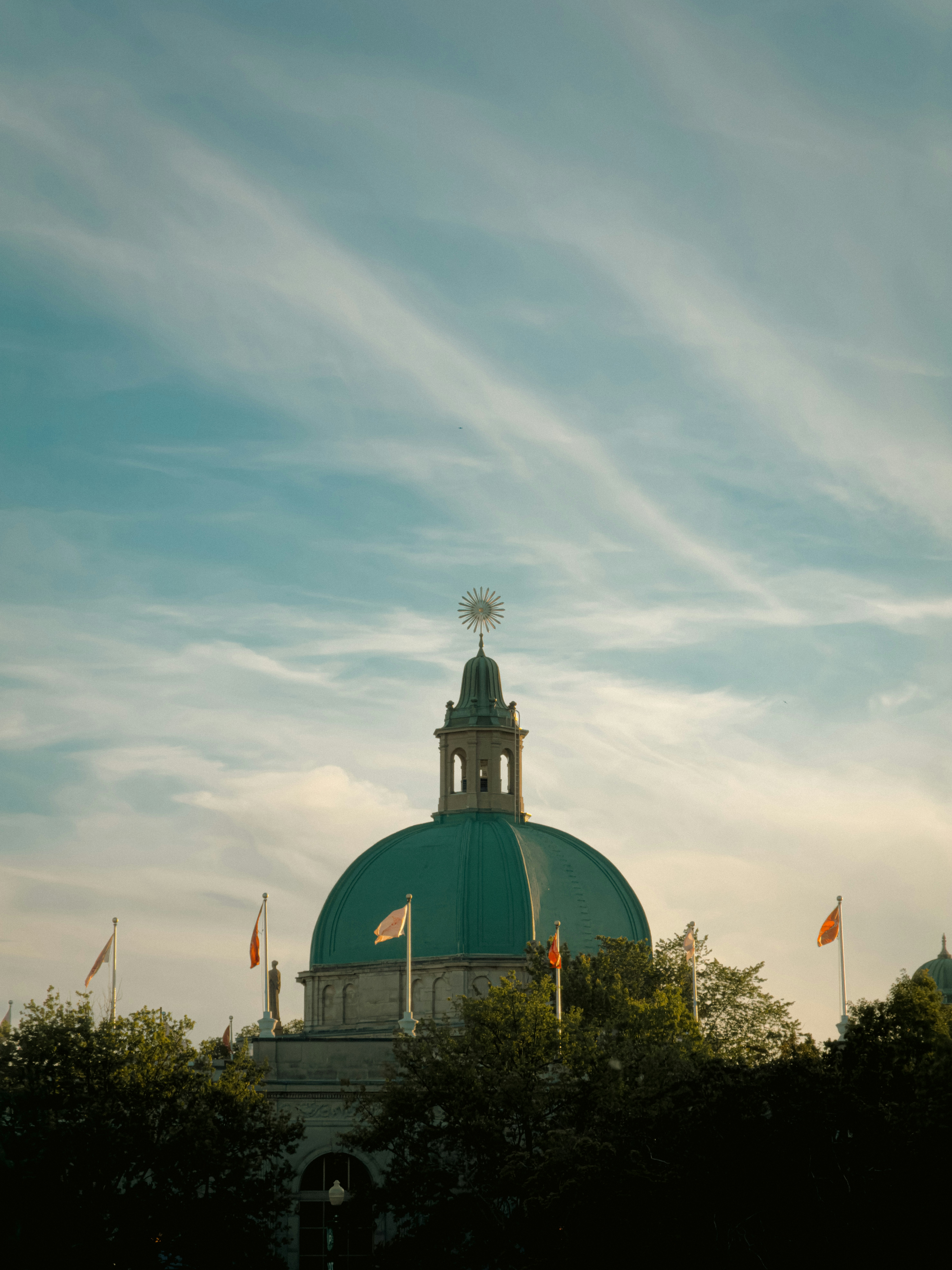 Dome of a Historic Structure Rising Above a Carved Sky