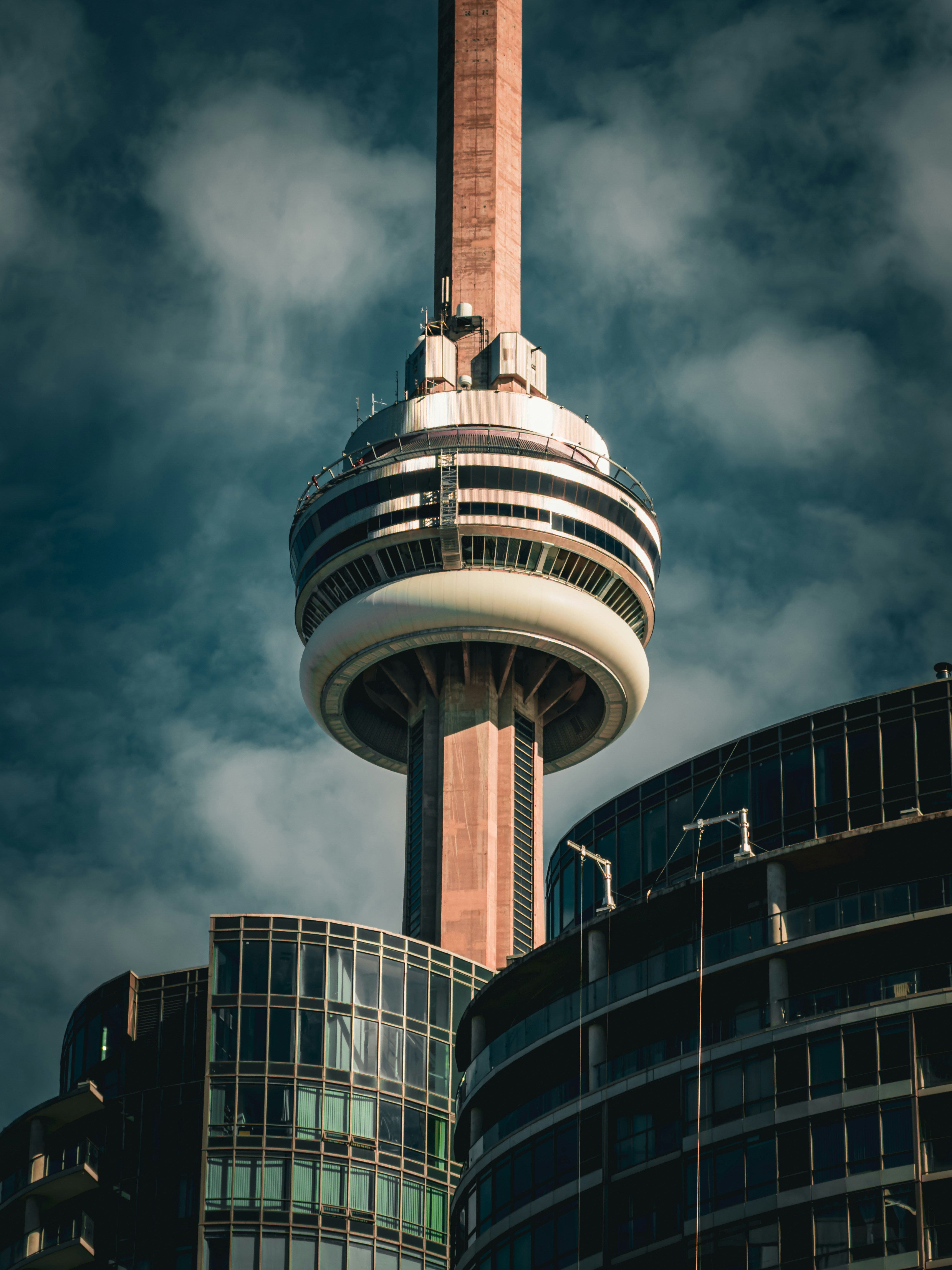 Neon Spire: The Observation Capsule Rises Above Glass and Steel