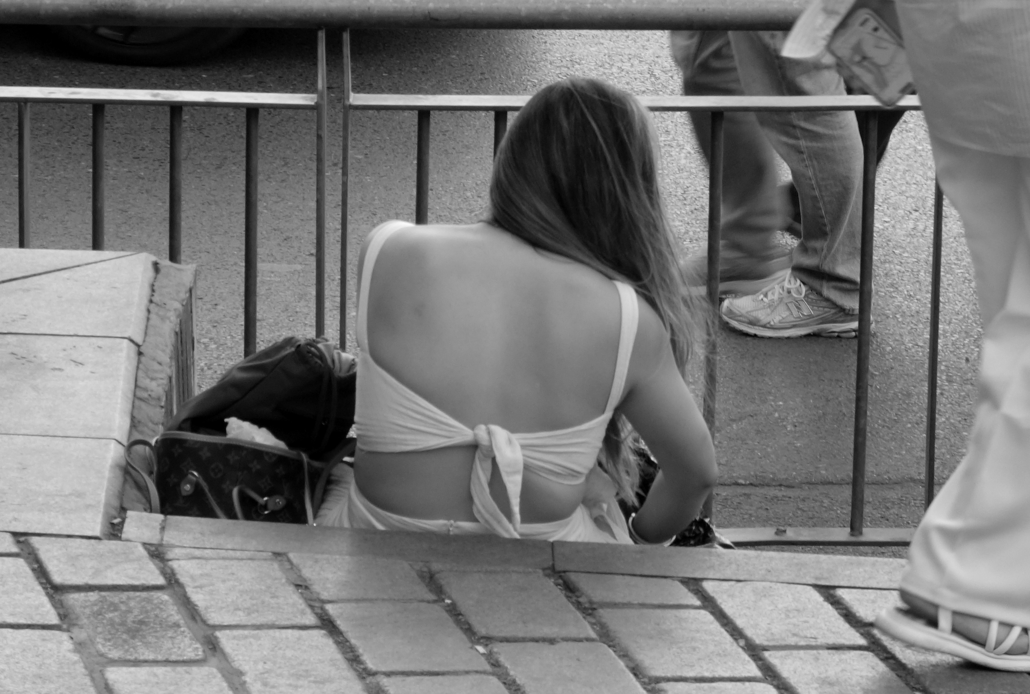 Backlit Curve: A Quiet Moment at the Barrier