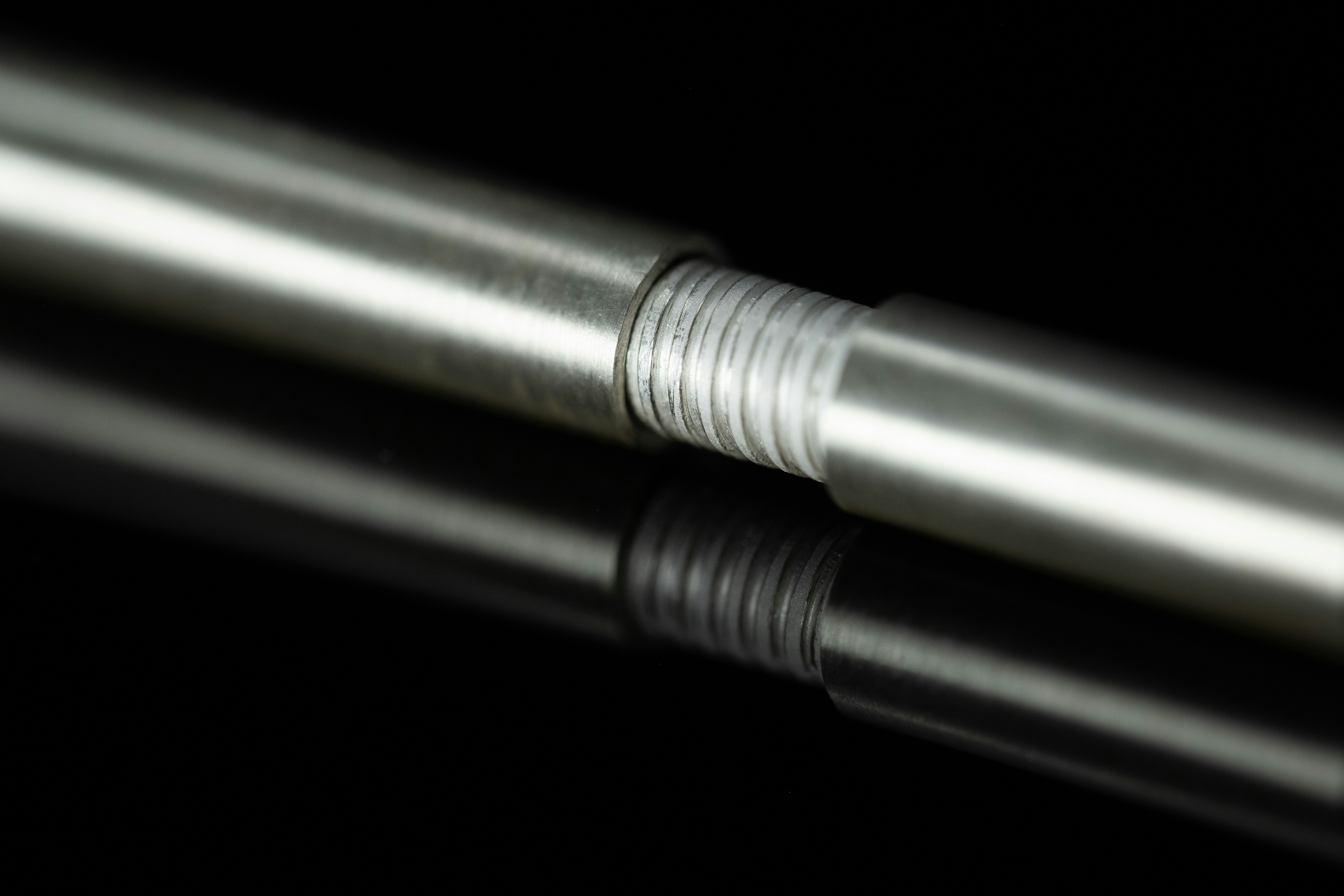 Machined Silence: A Close-up of Stainless Threads