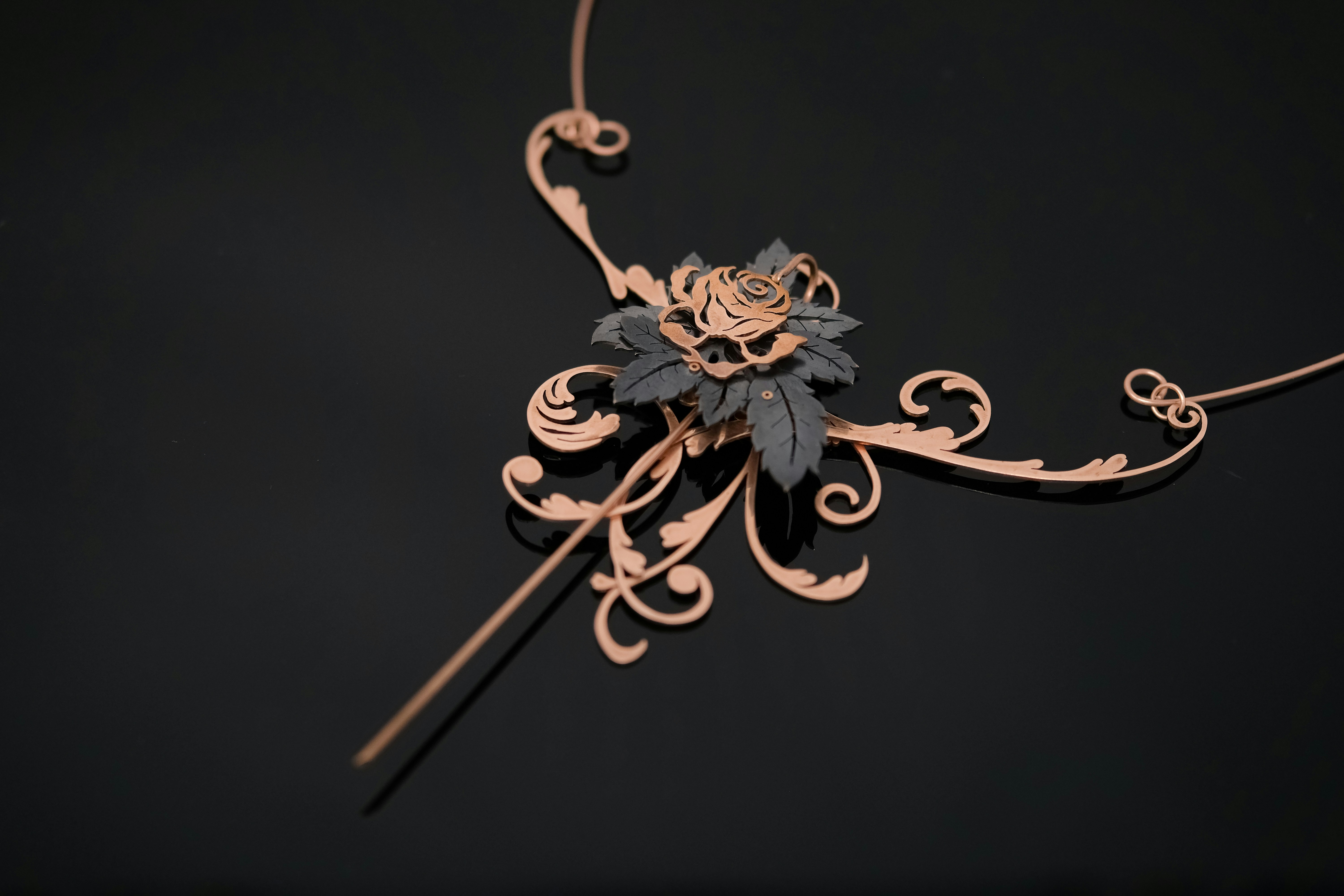 Ornate Copper Floral Motif on Velvet Night