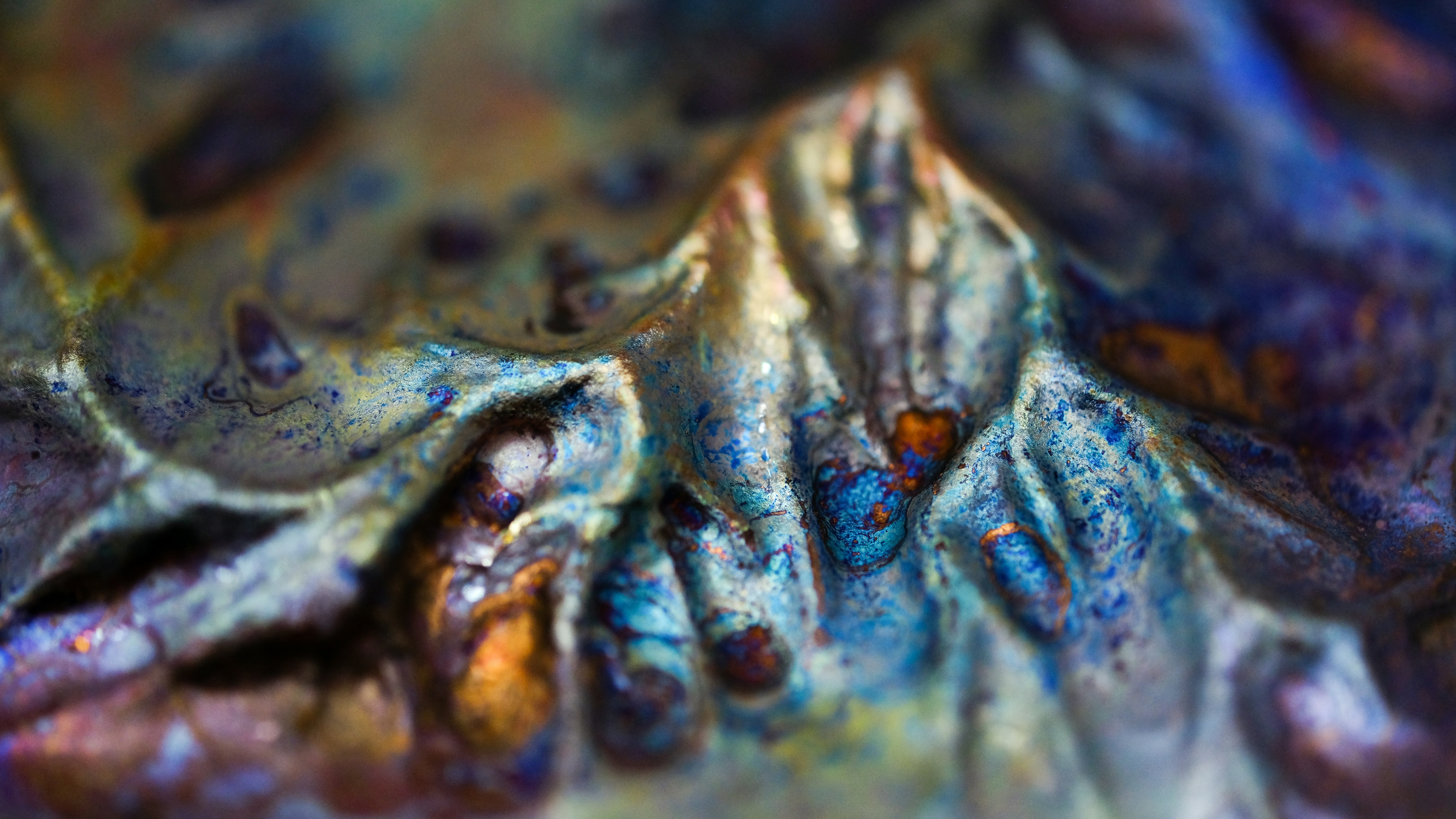 Chromatic Ridge: An Abstract Close-Up of Mineral Blues and Golds