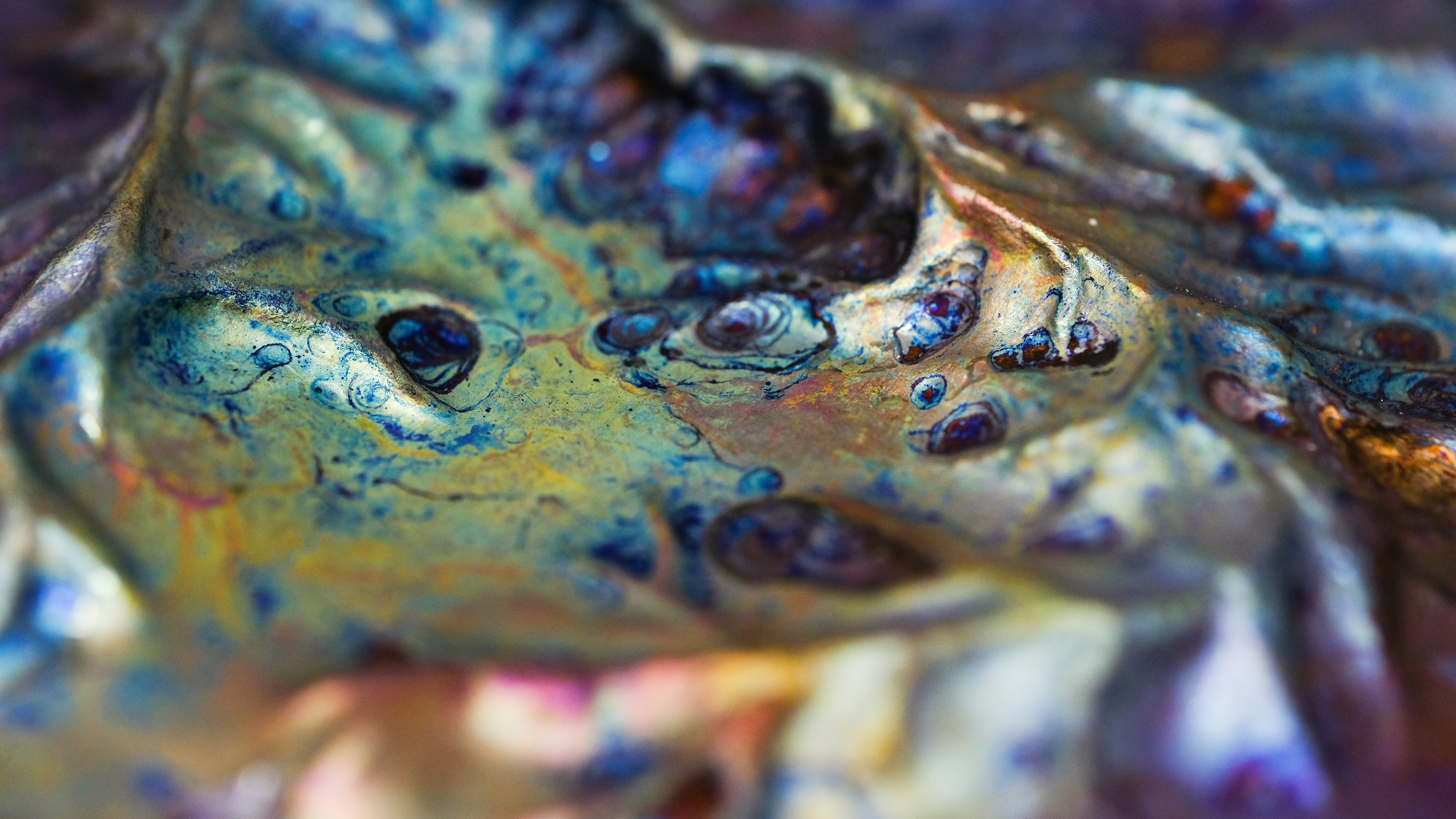 Colorful, Textured Abstraction: Metallic Blues and Yellows in Fluid Painted Form
