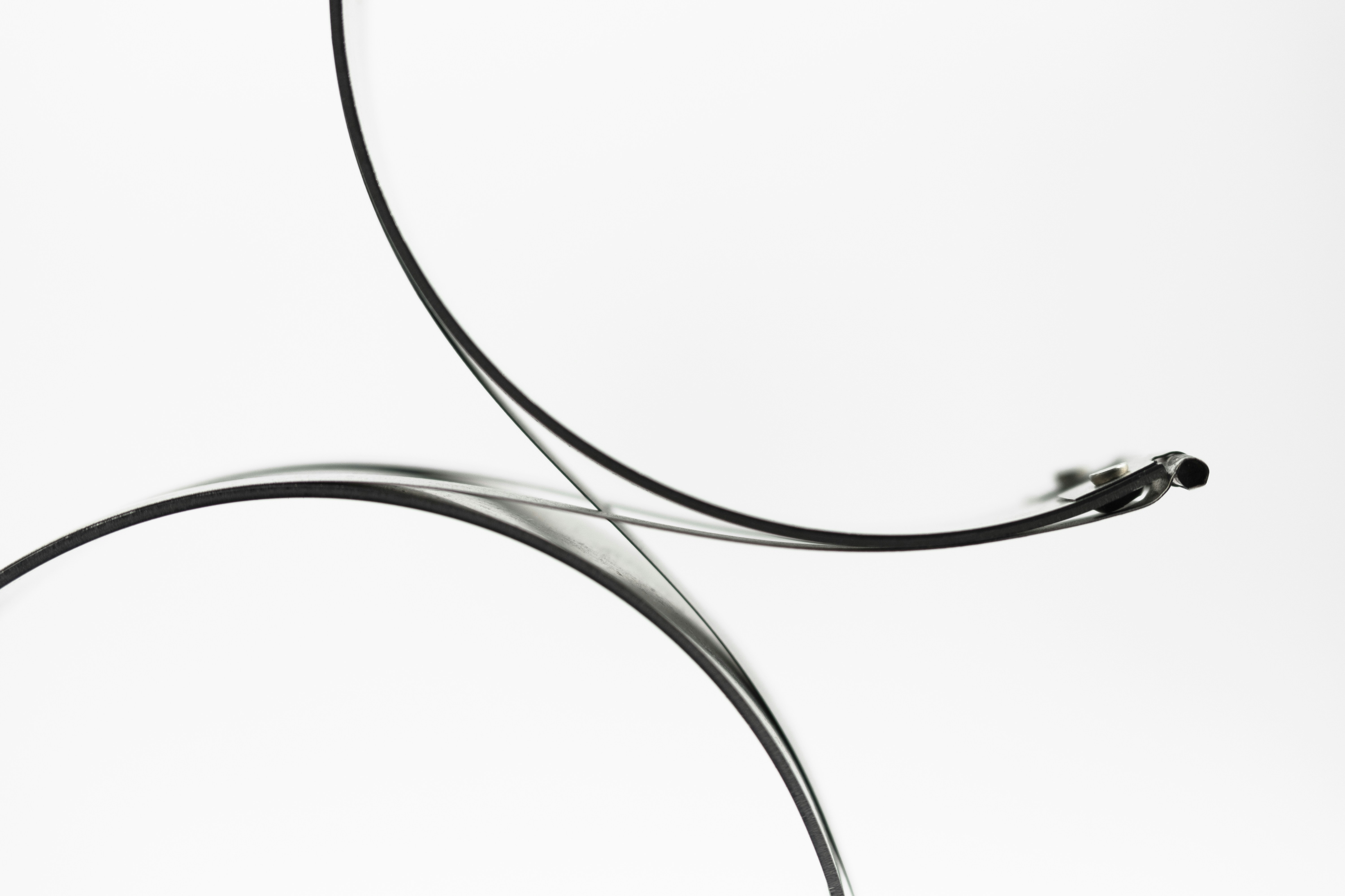 Minimalist Cables: A Quiet Dance of Light and Curves