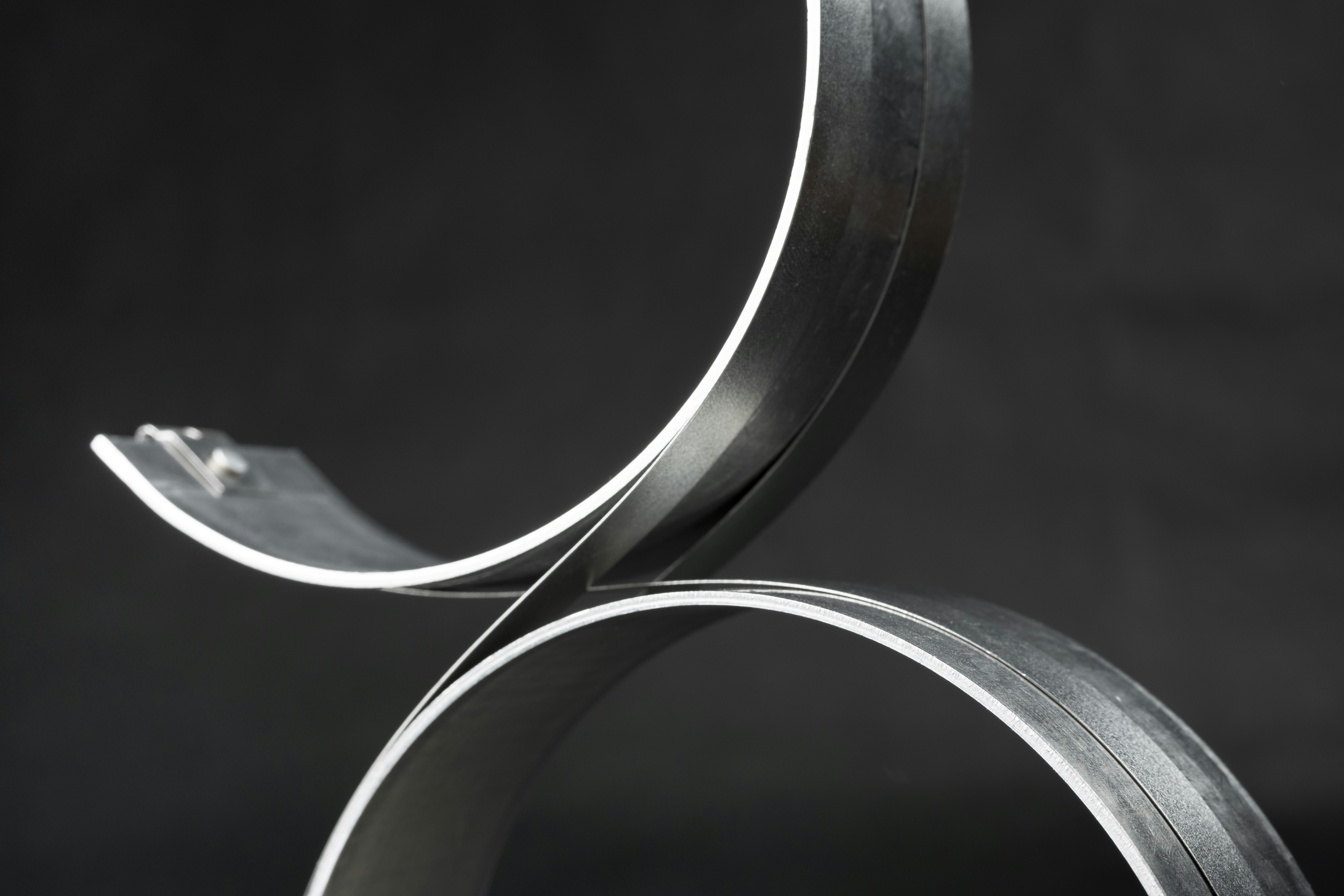 Curves in Focus: Abstract Metal Ribbons in Mono