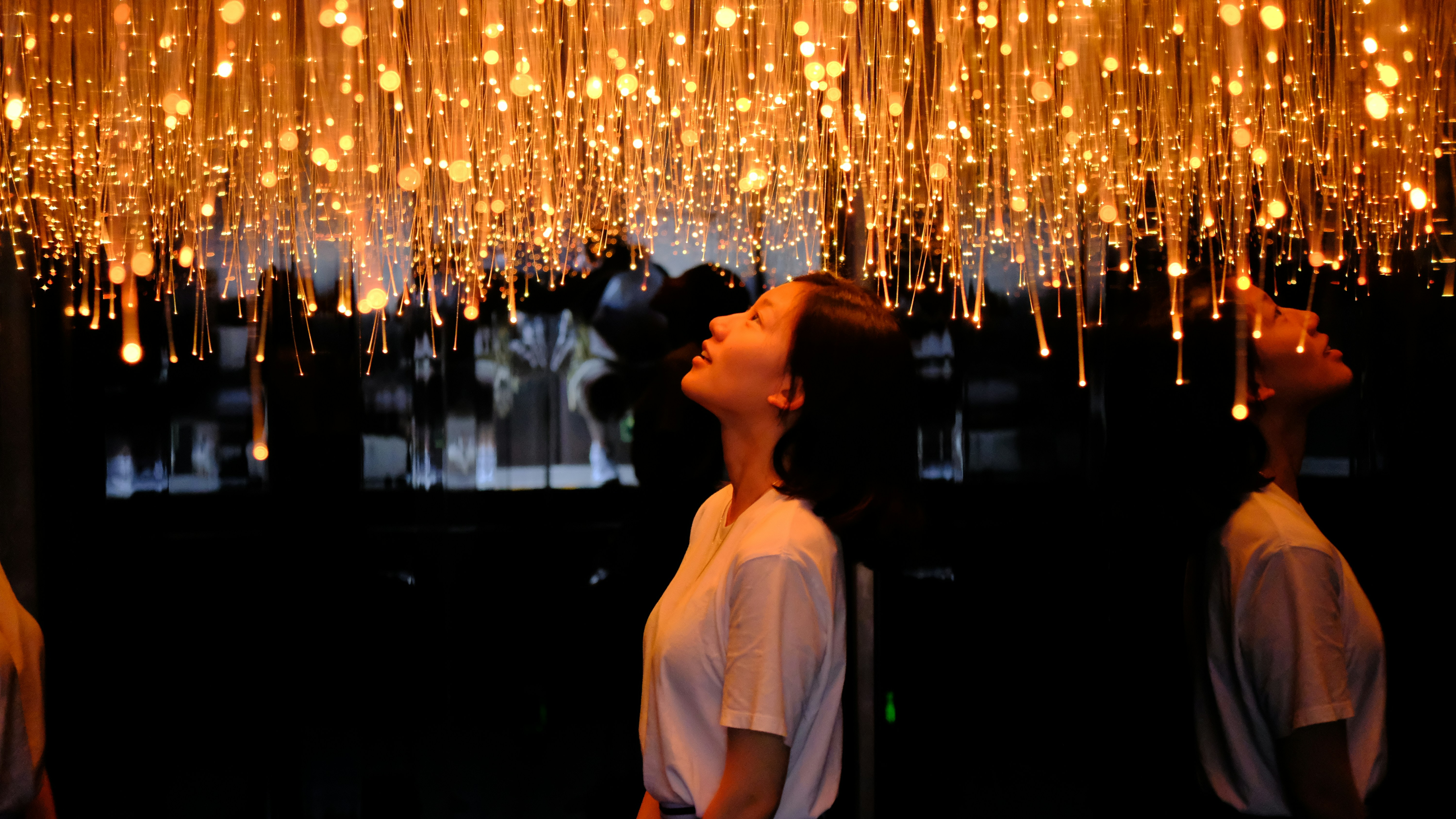 Under the Golden Drizzle: A Quiet Moment with Light Ceiling